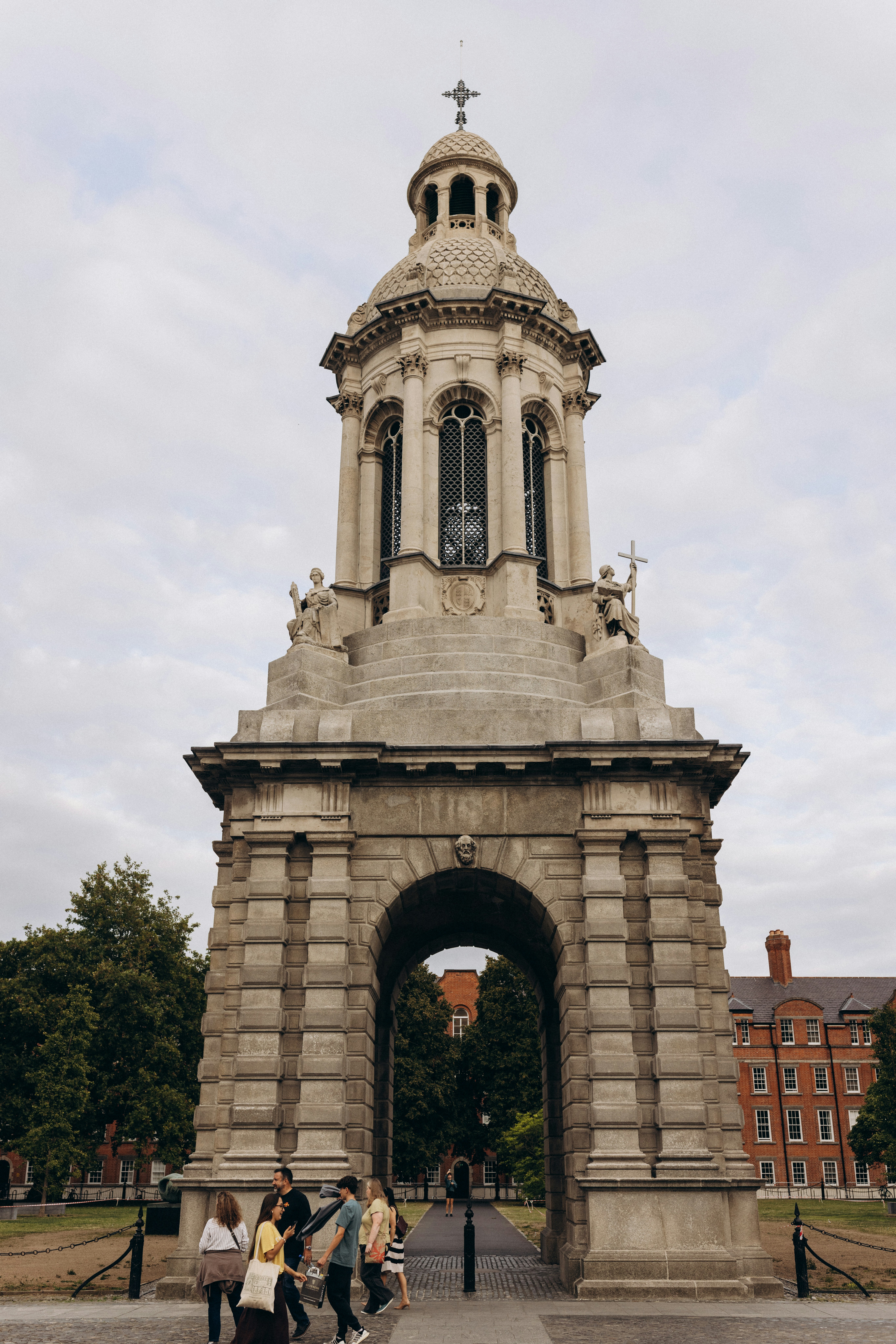 Towering Gate: A Stone Monument Framing a Path to the Pedestrian Courtyard