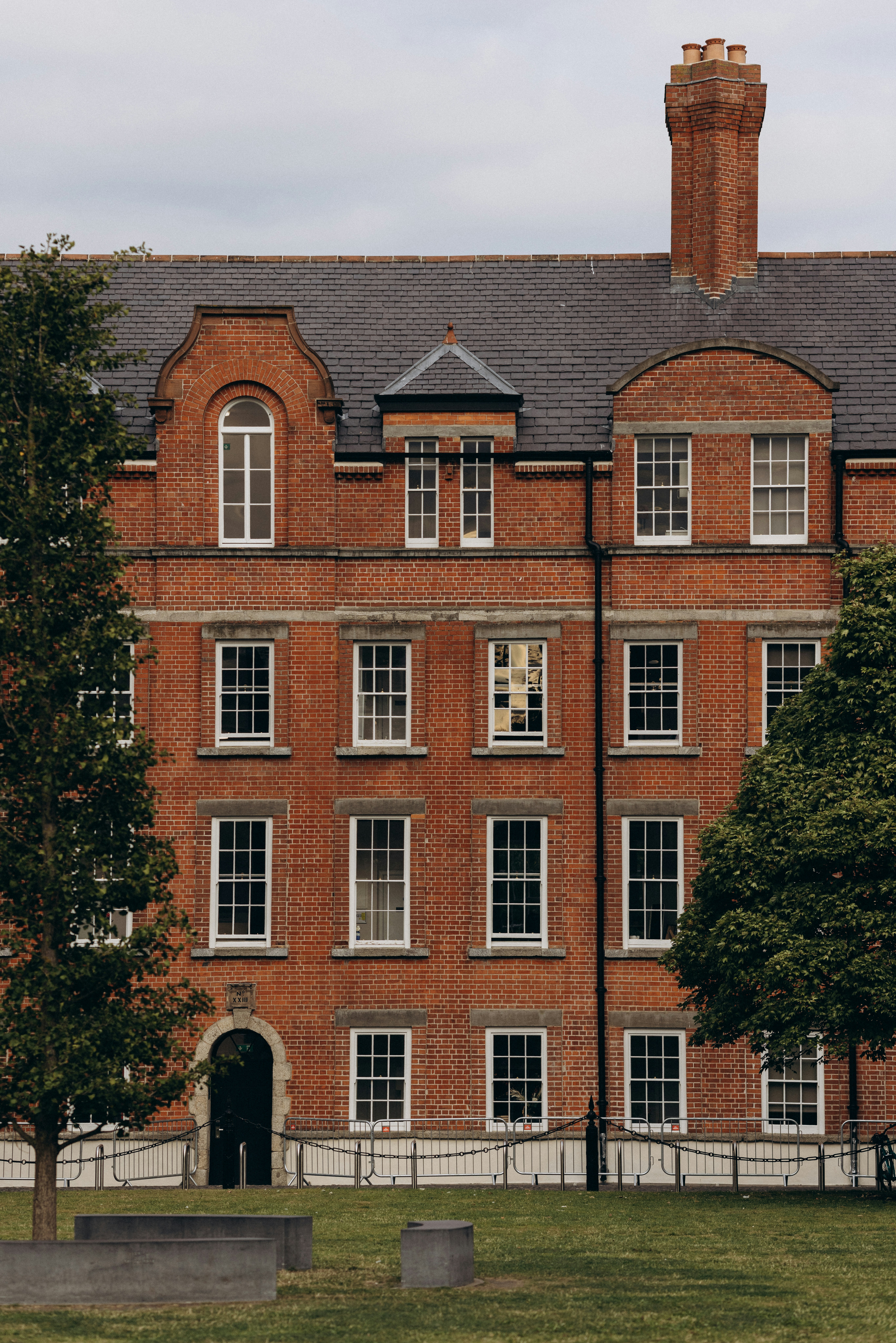 Brick Facade Symmetry: A Victorian townhouse Row