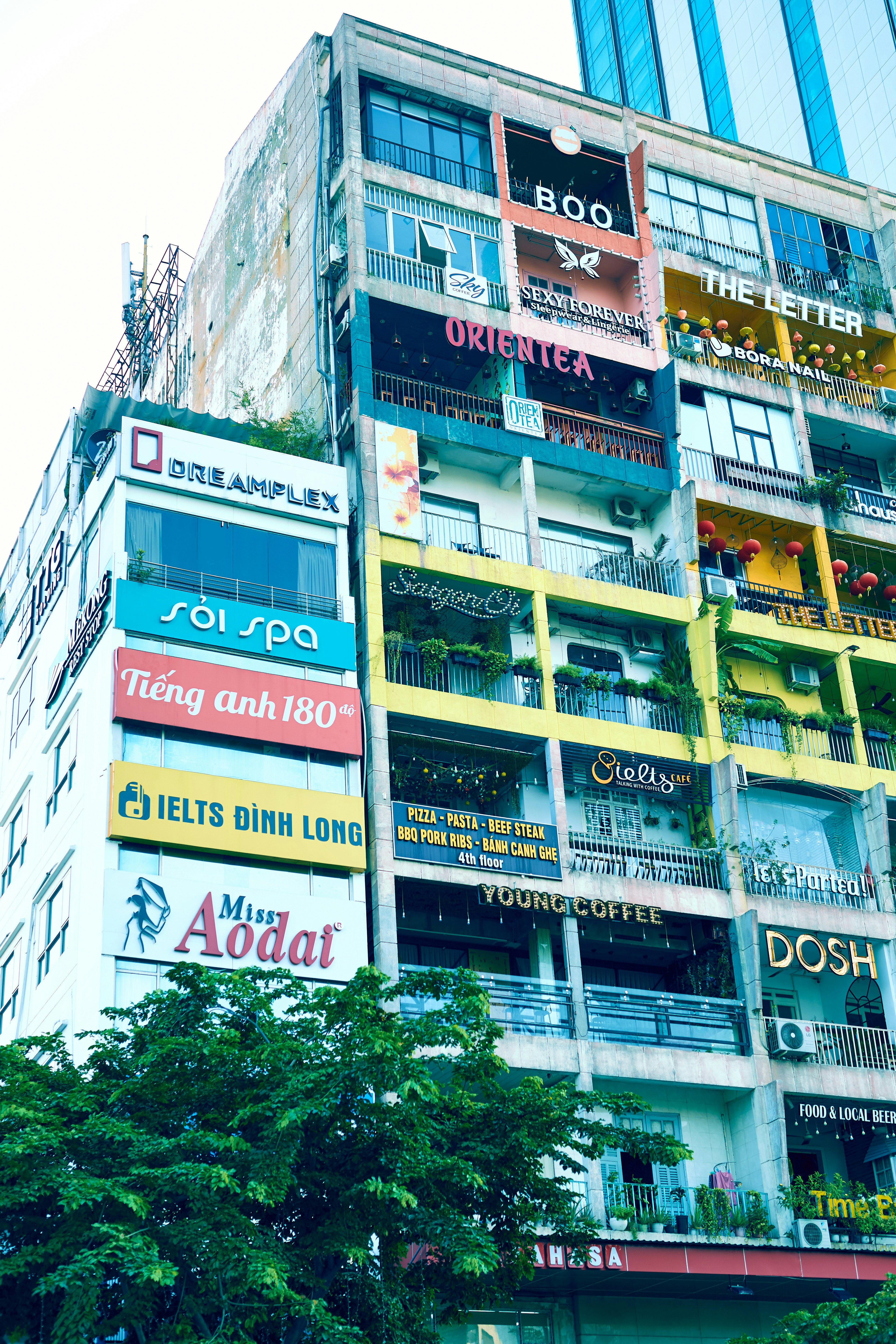 Neon Facade: A Multi-Signage Vertical Street Portrait