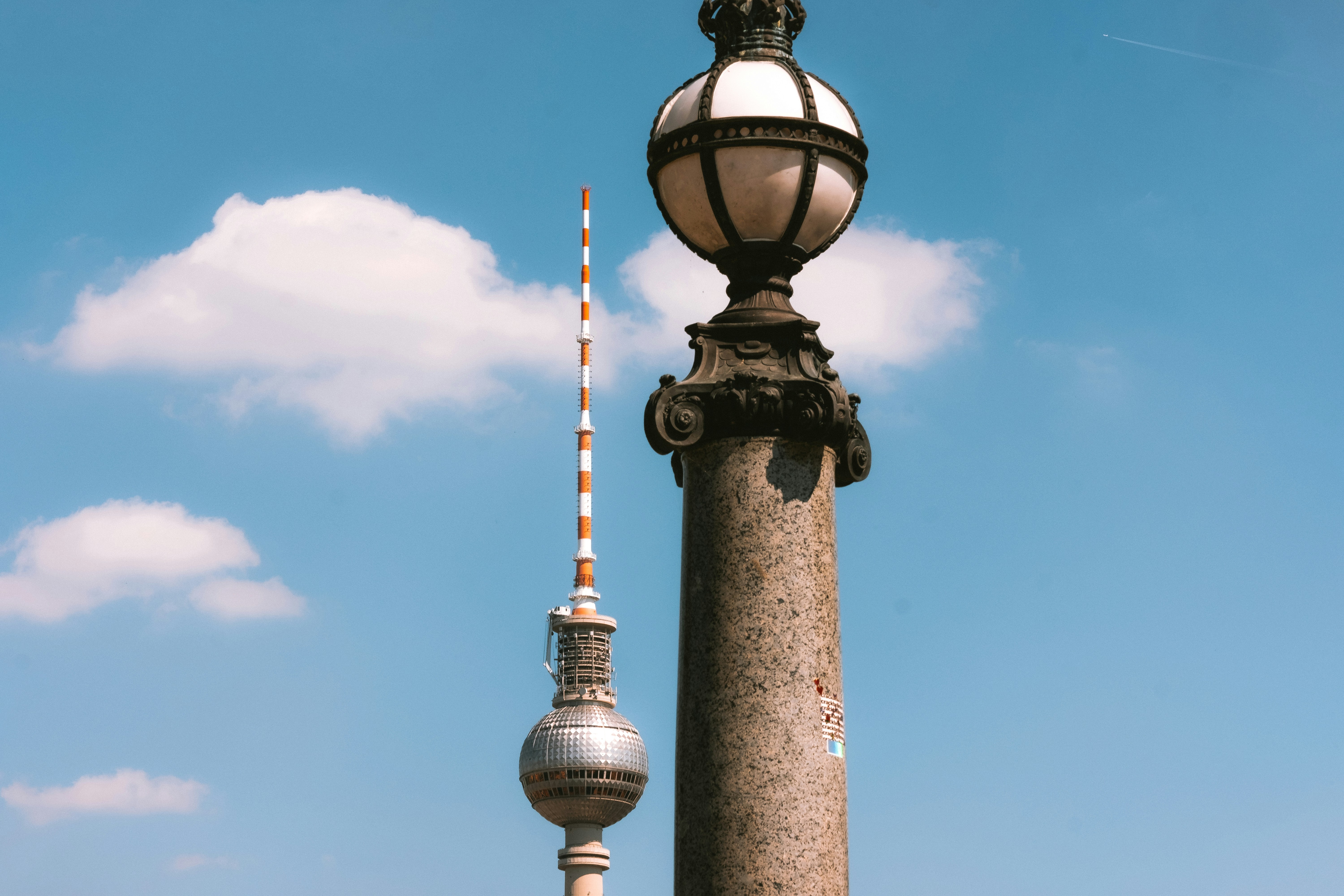 Twin Orbs Against a Clear Sky: A Tale of Towers