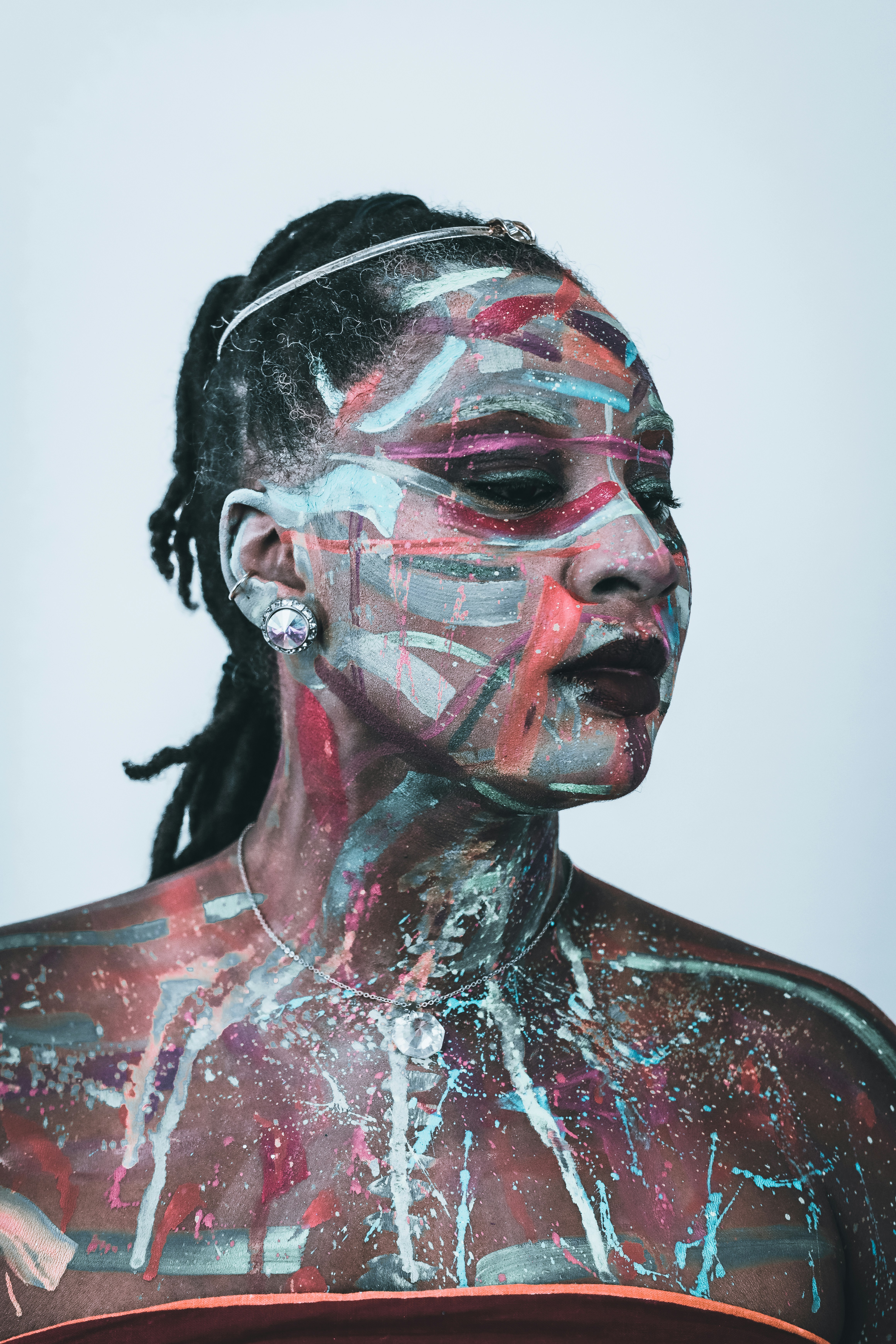Prismatic Muse: A Portrait of Painted Silence
