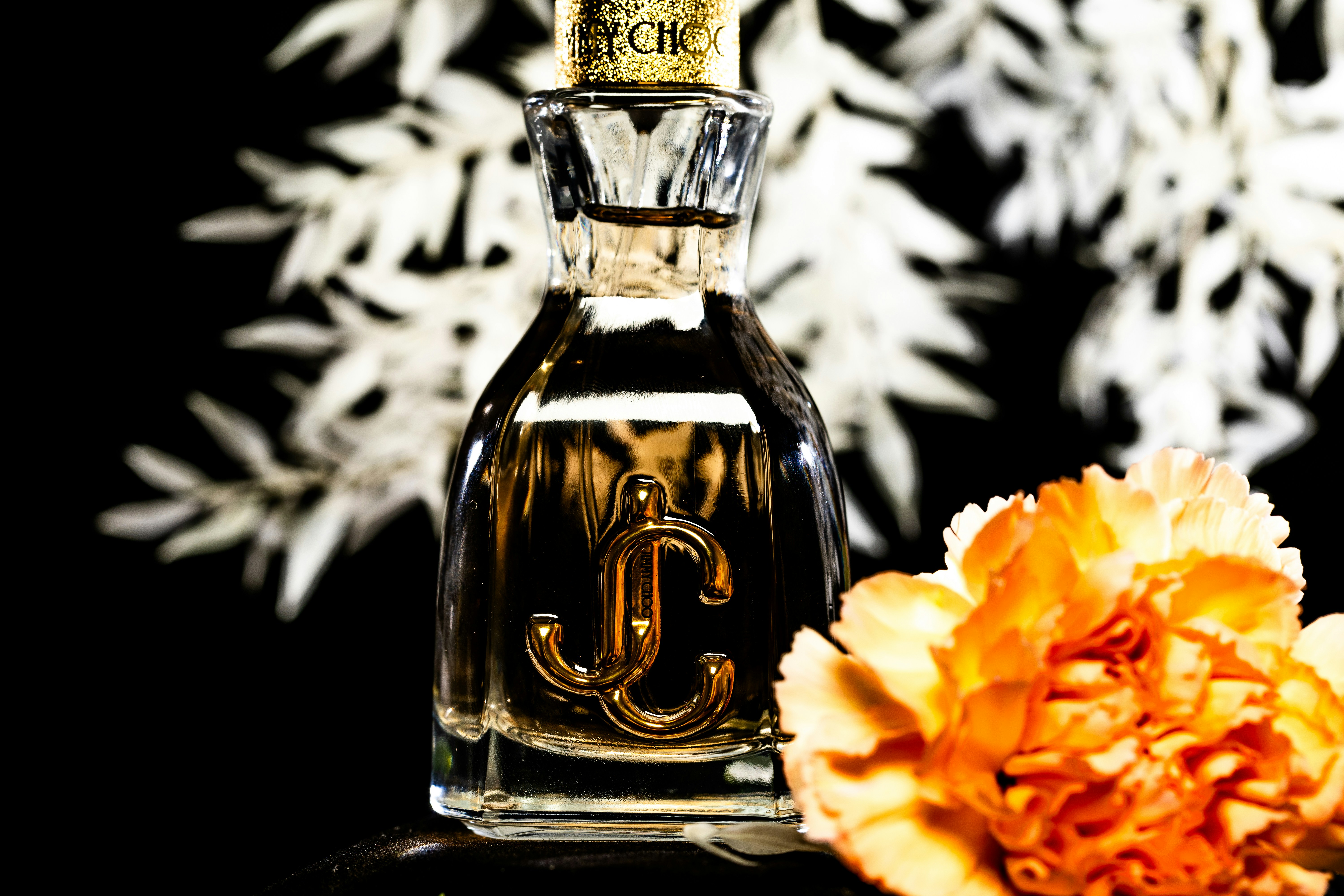 Golden Scent: A Crystal Bottle with Orange Bloom