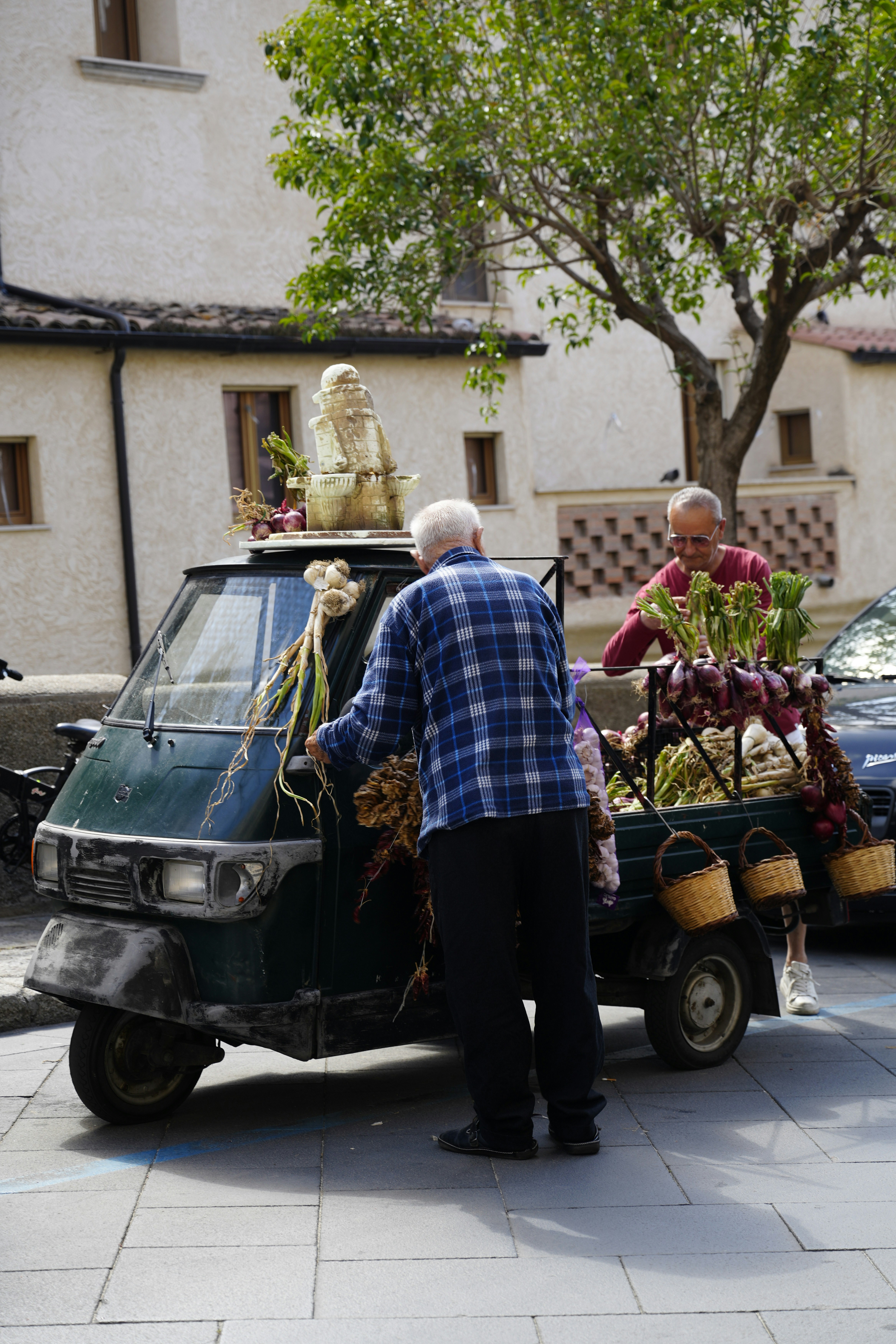 Street Vendors with a Harvest of Garlic and Produce