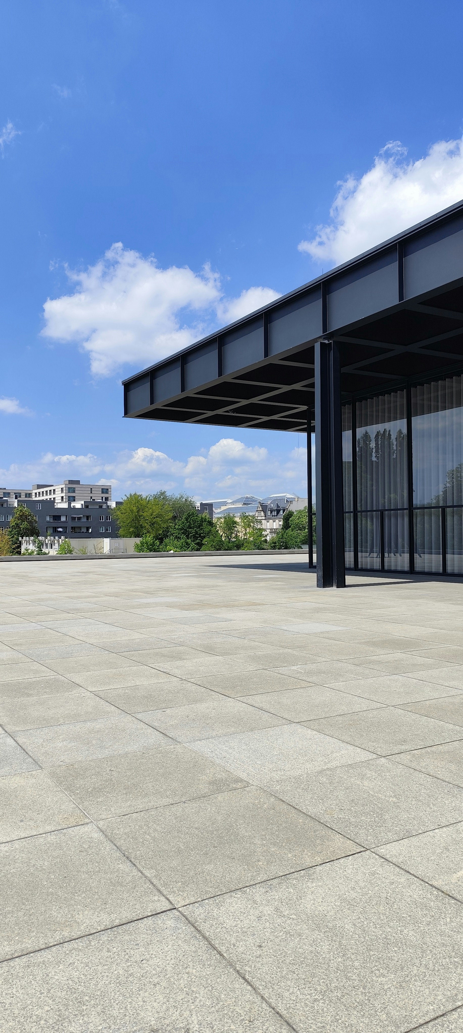 Minimalist Terrace: The Edge of Modern Architecture Under Bright Sky