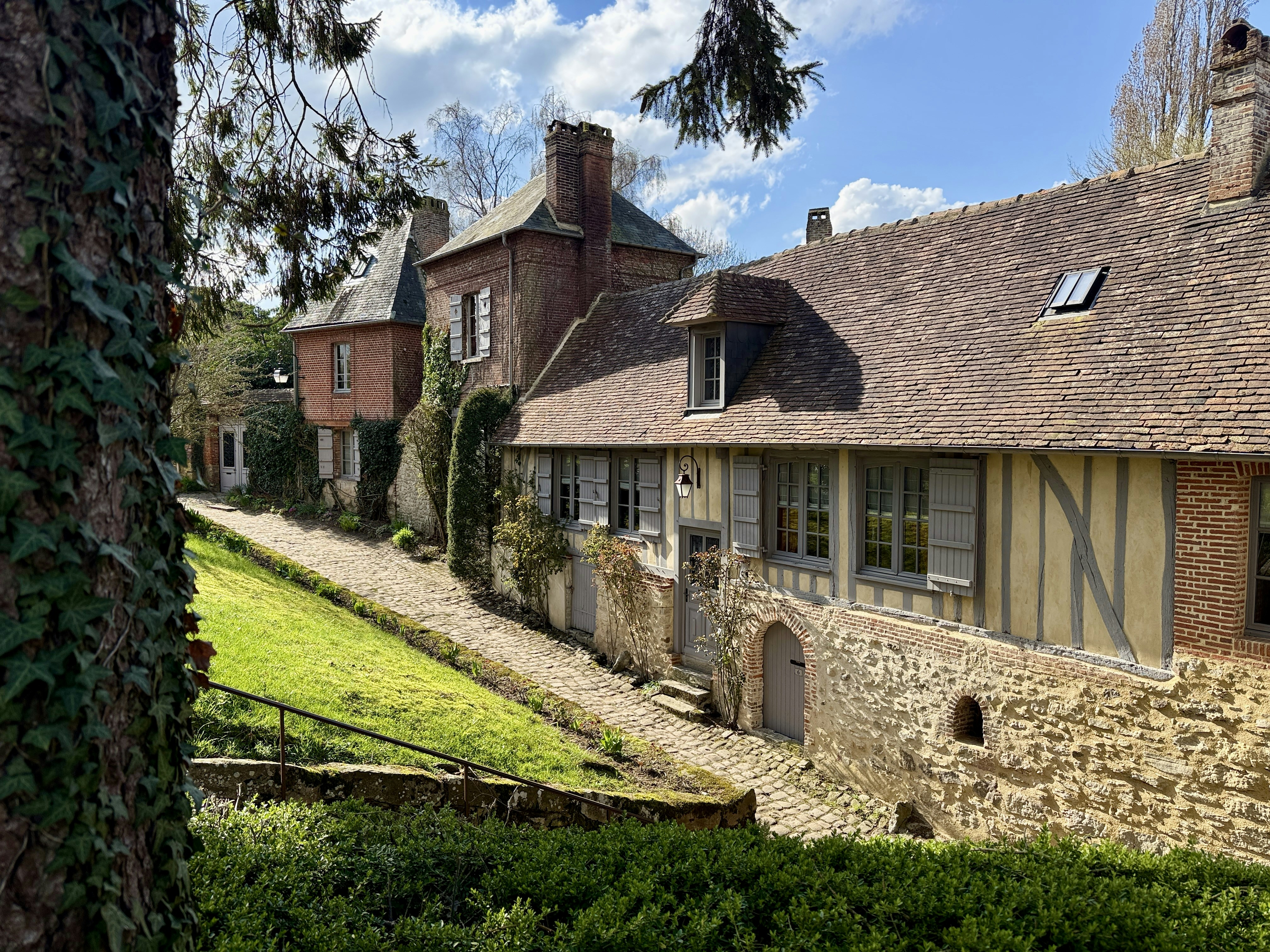 Cobbled Lane and Timbered Facades in a Quiet Village
