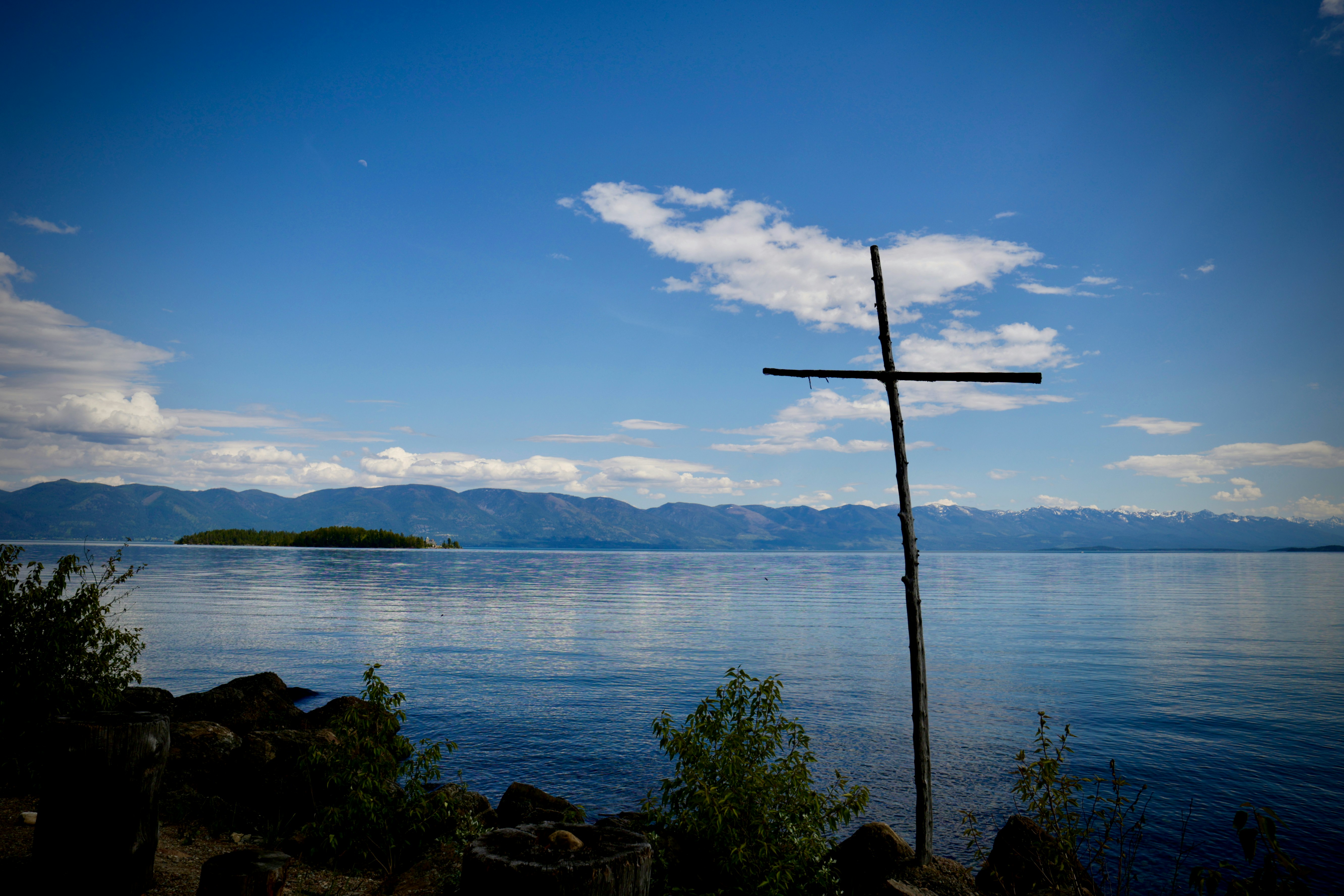 A Quiet Cross Over a Sunlit Bay
