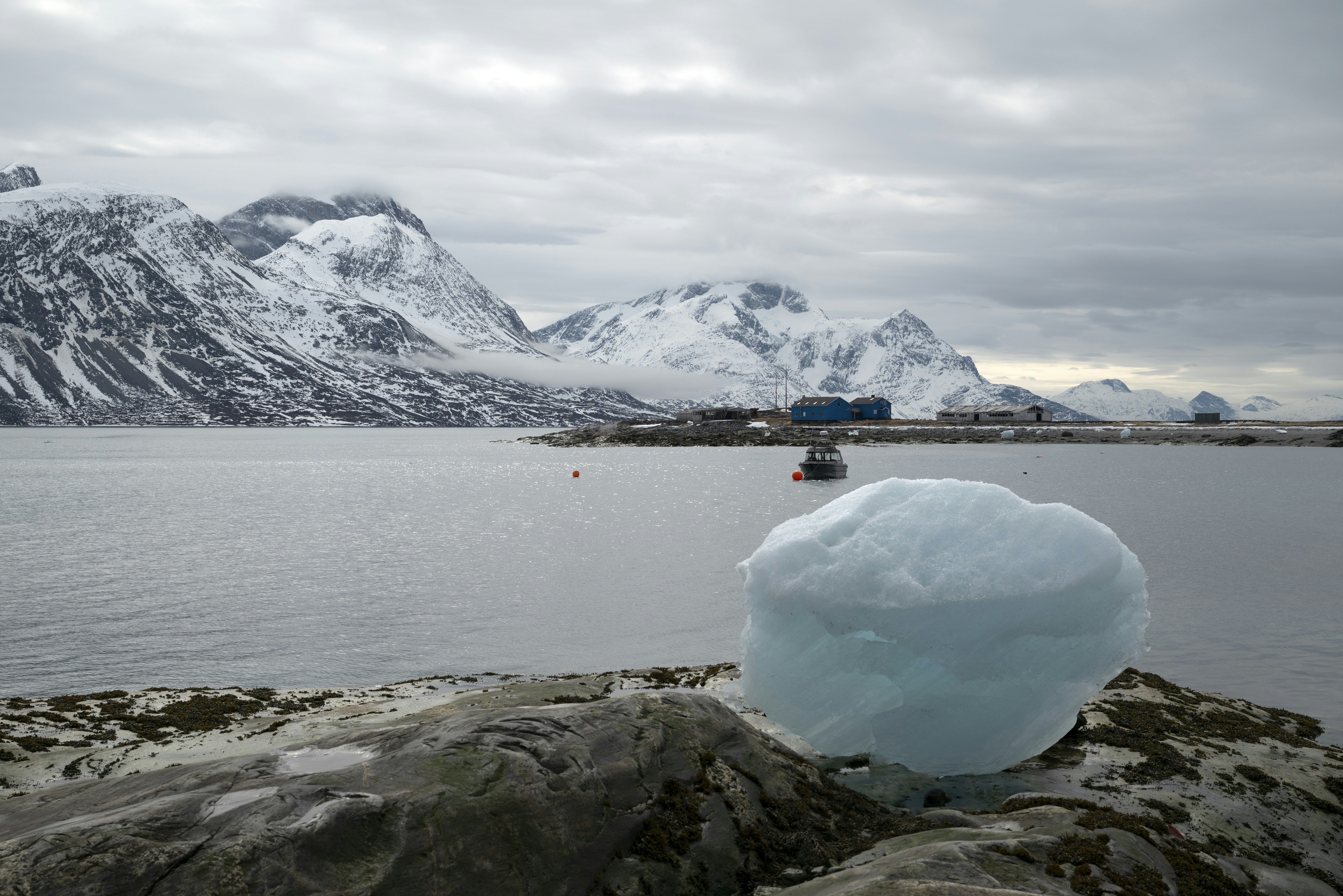 Icebound Fjord: A Quiet Moment by the Glacier