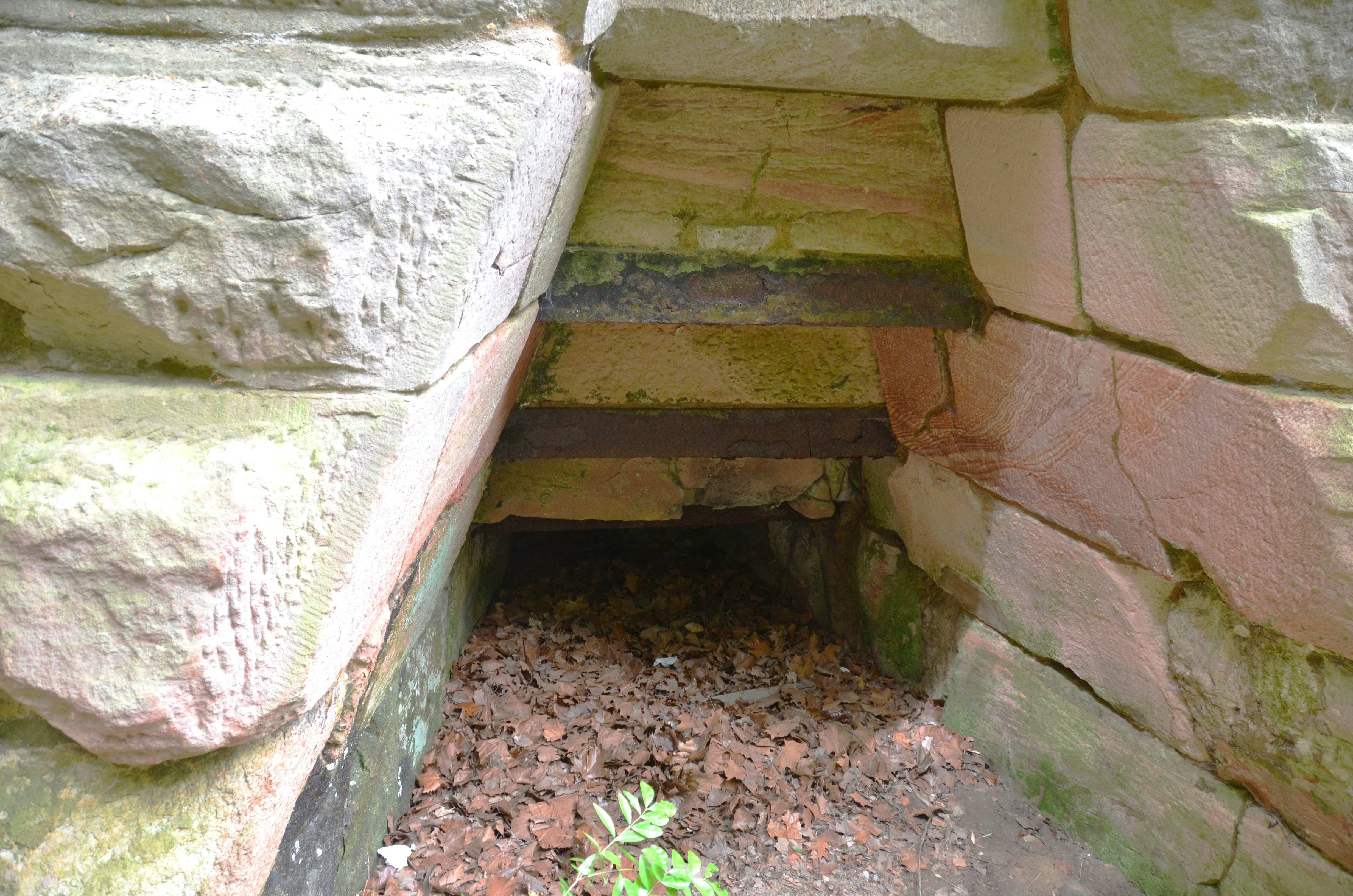 Mossed Stone Archway Opening to a Dark Nook