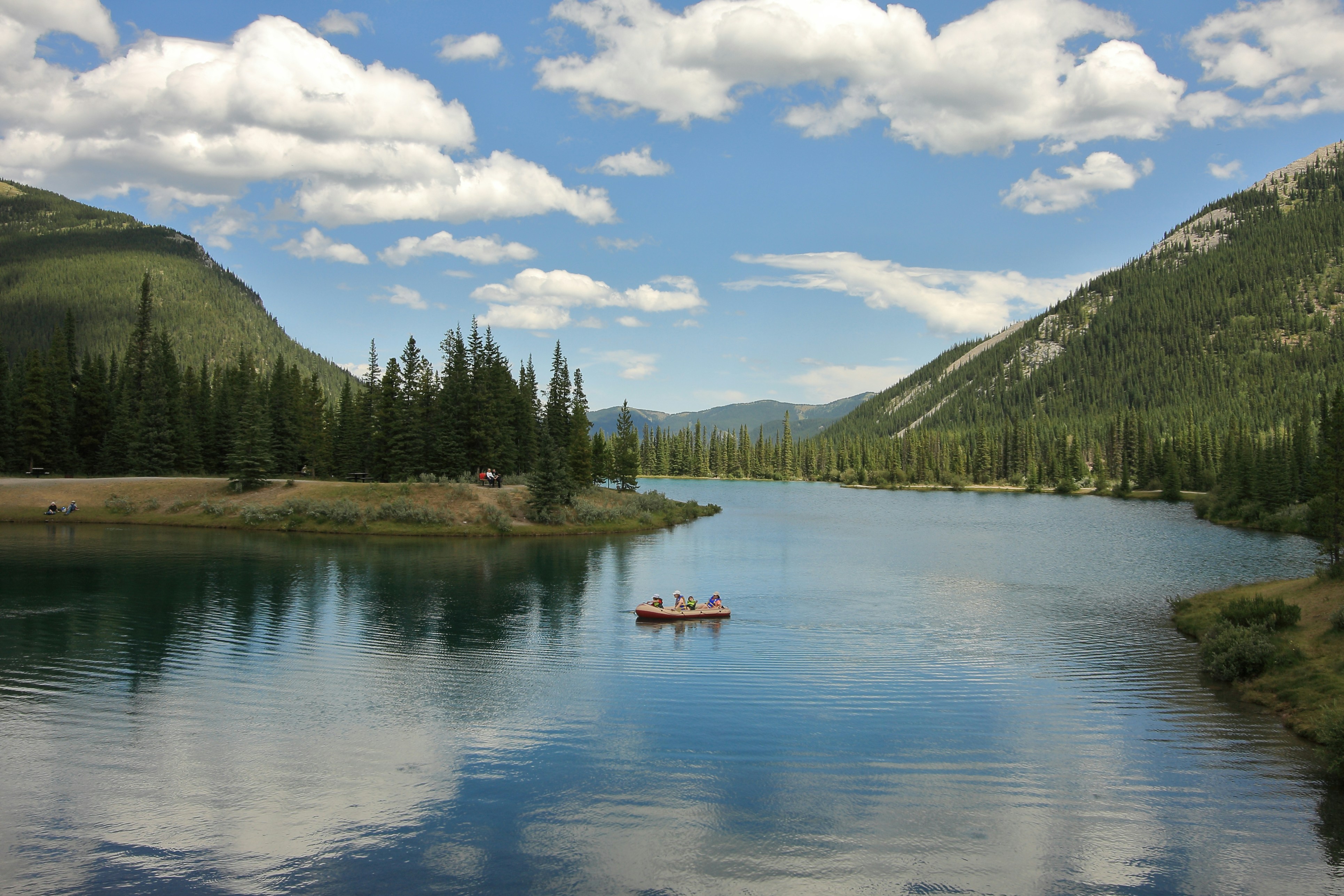 Central Canoe Drift Through Alpine Mirror