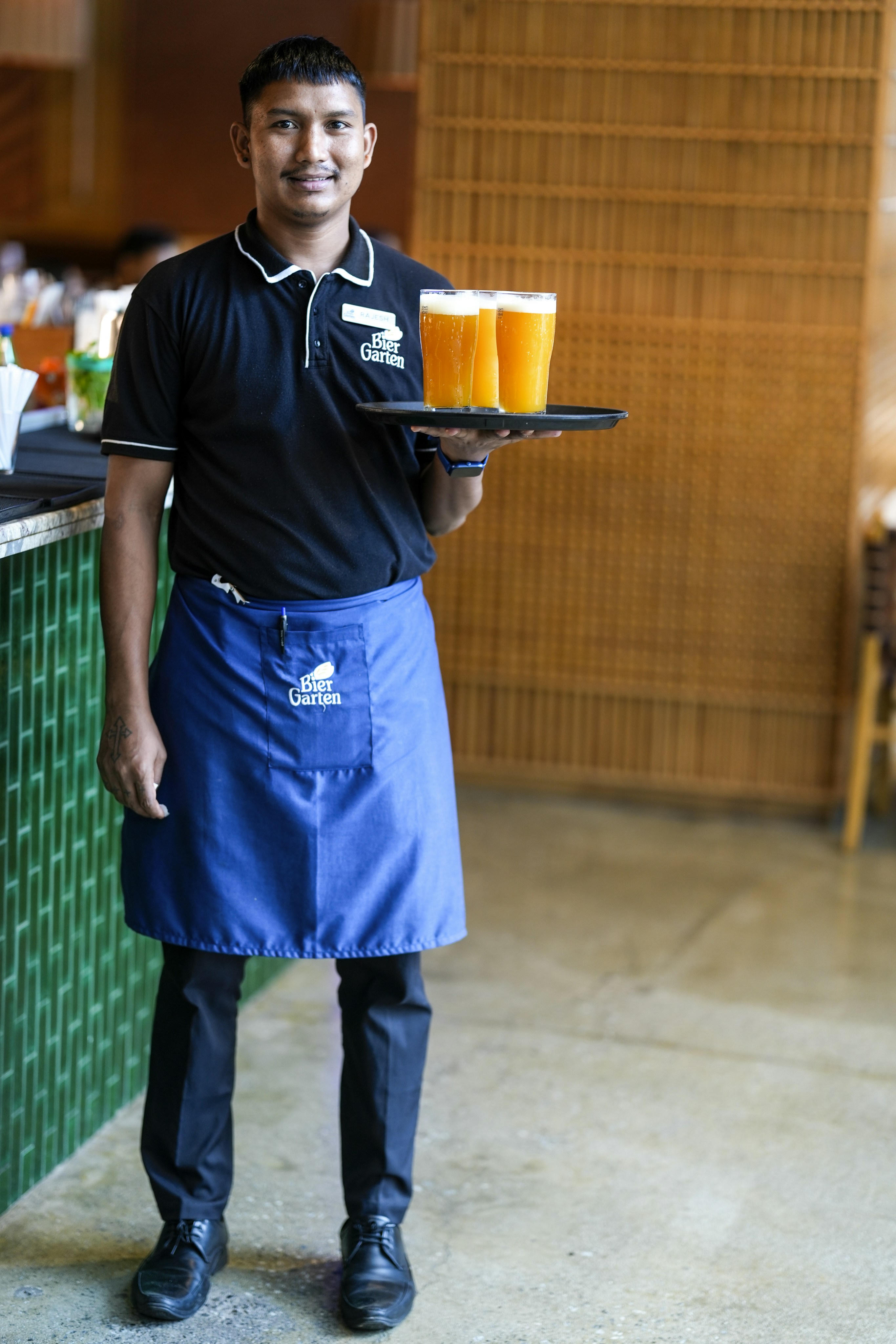 The Tray of Glasses: A Waiter in Blue Apron Stance
