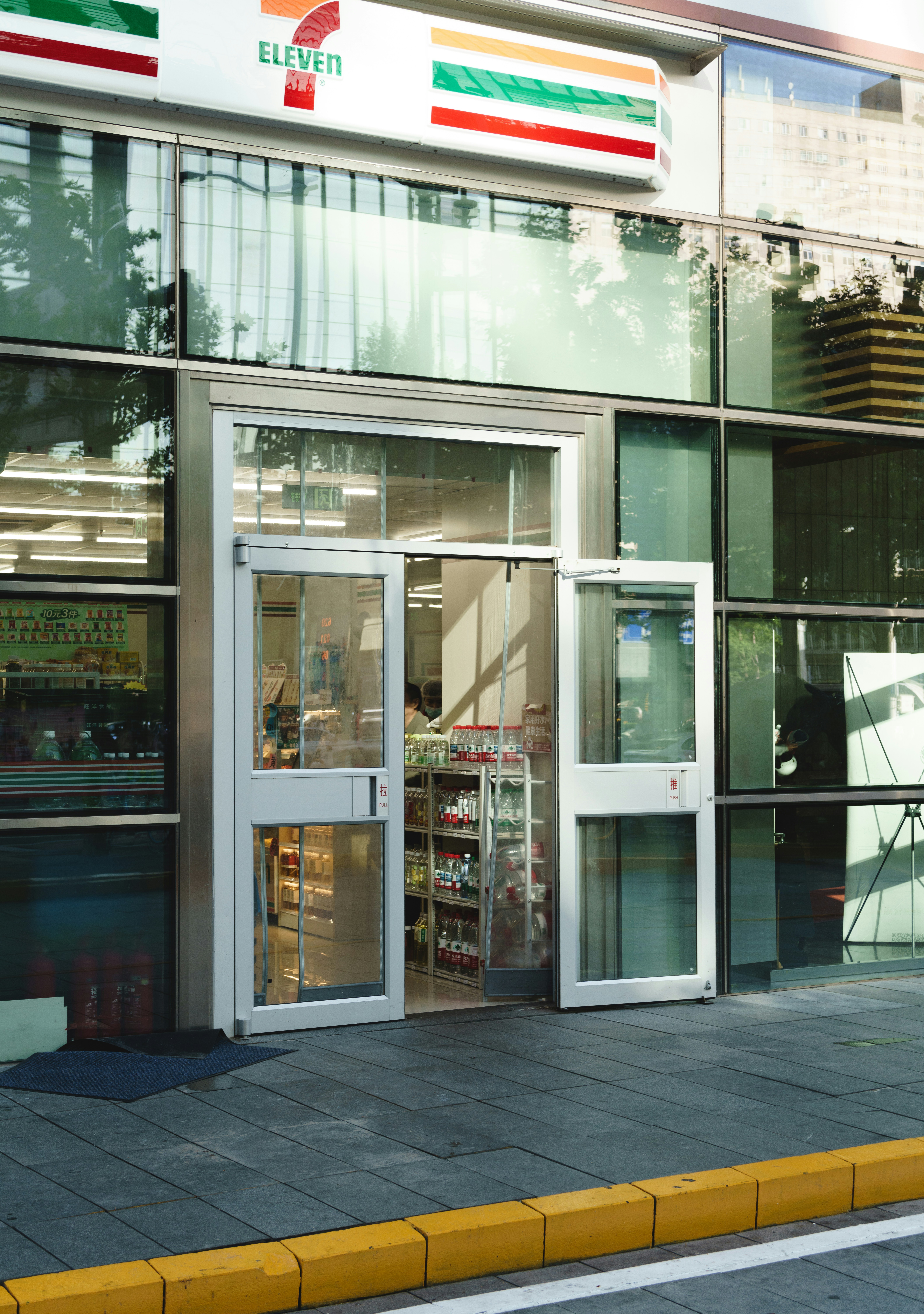 Clear Glass Front: A Convenience Store Opens to the Street