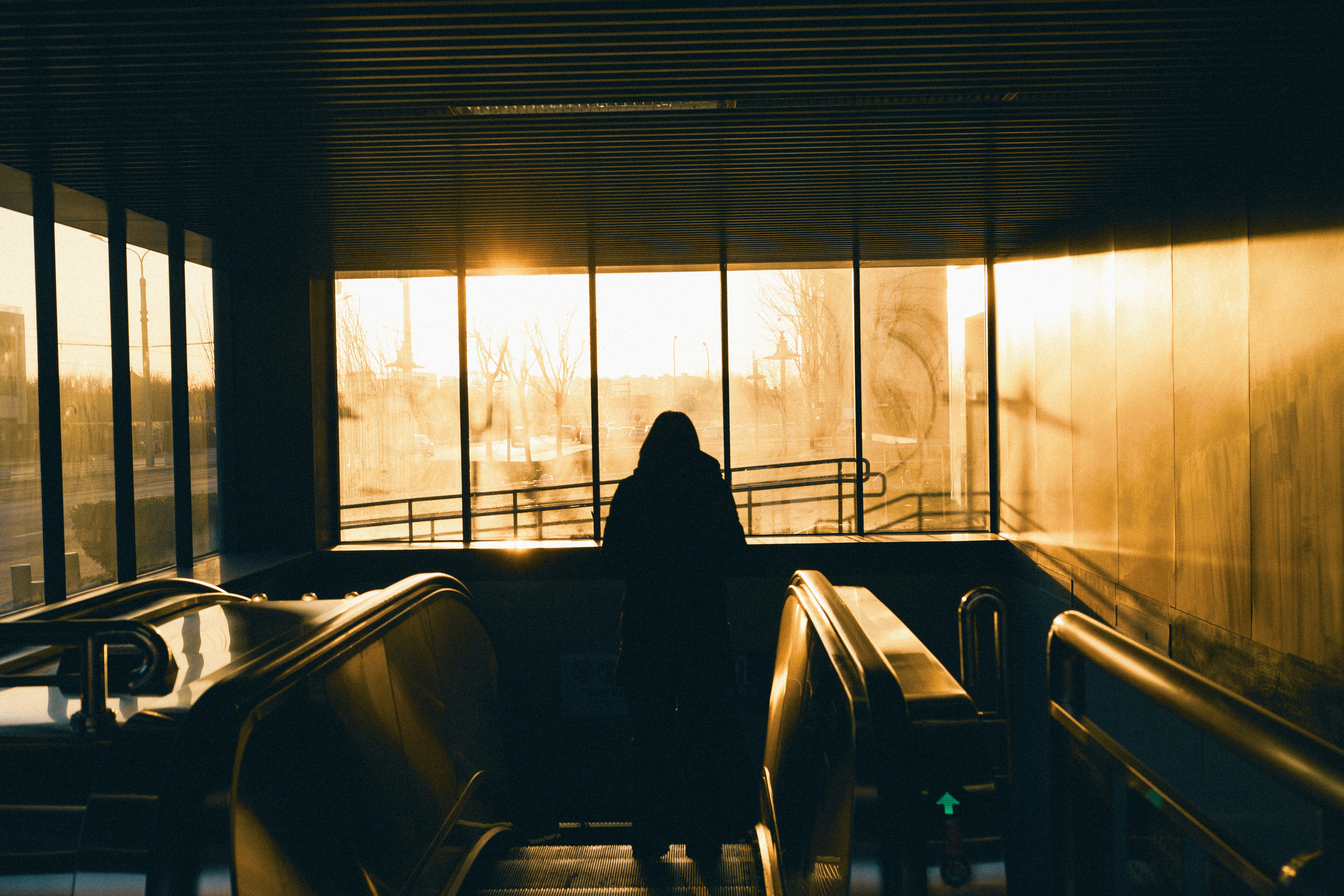 Silhouette in Golden Hour At the Escalator
