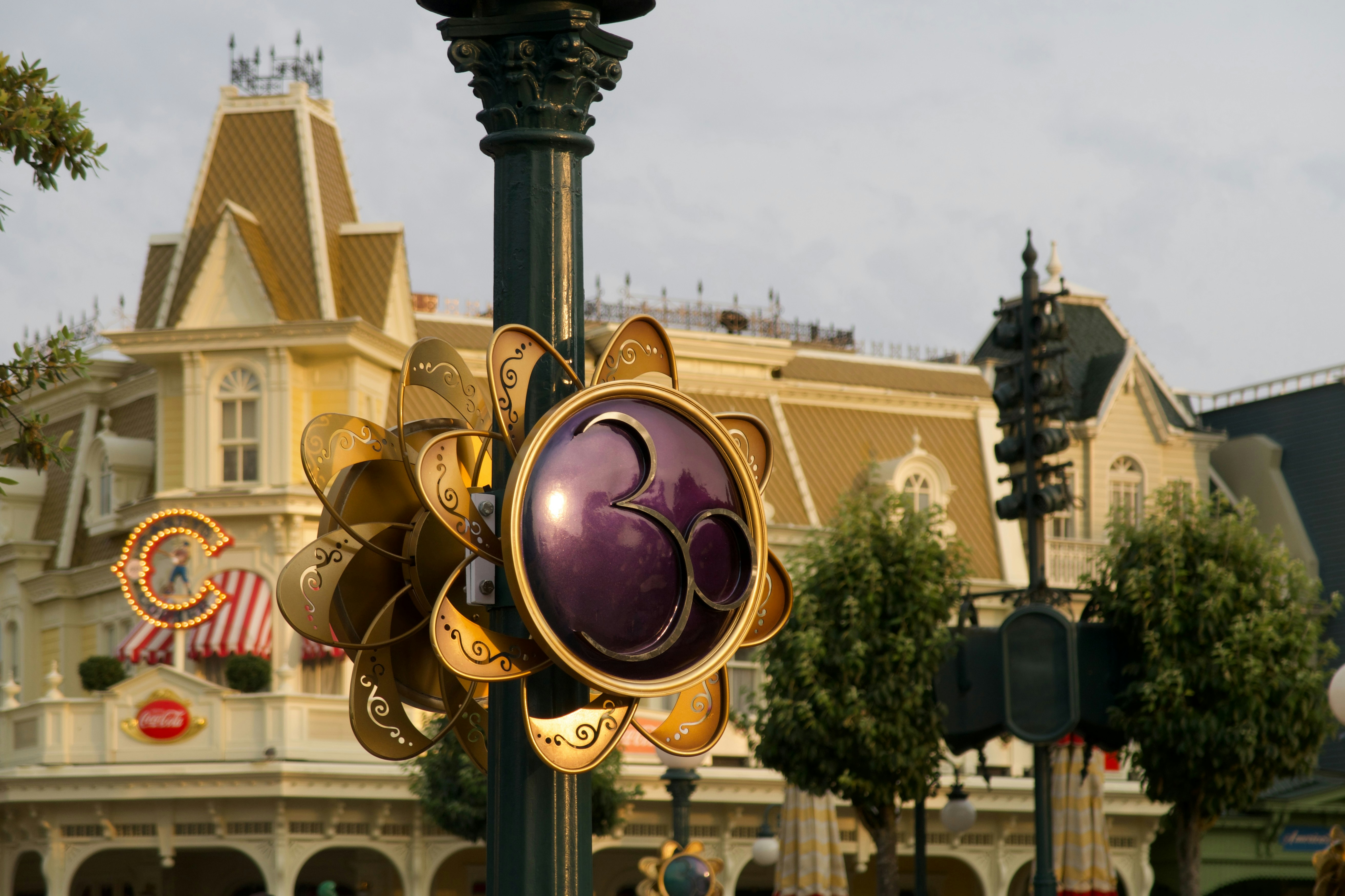 Golden Flower on a Lamp Post in a Disney-Style Main Street