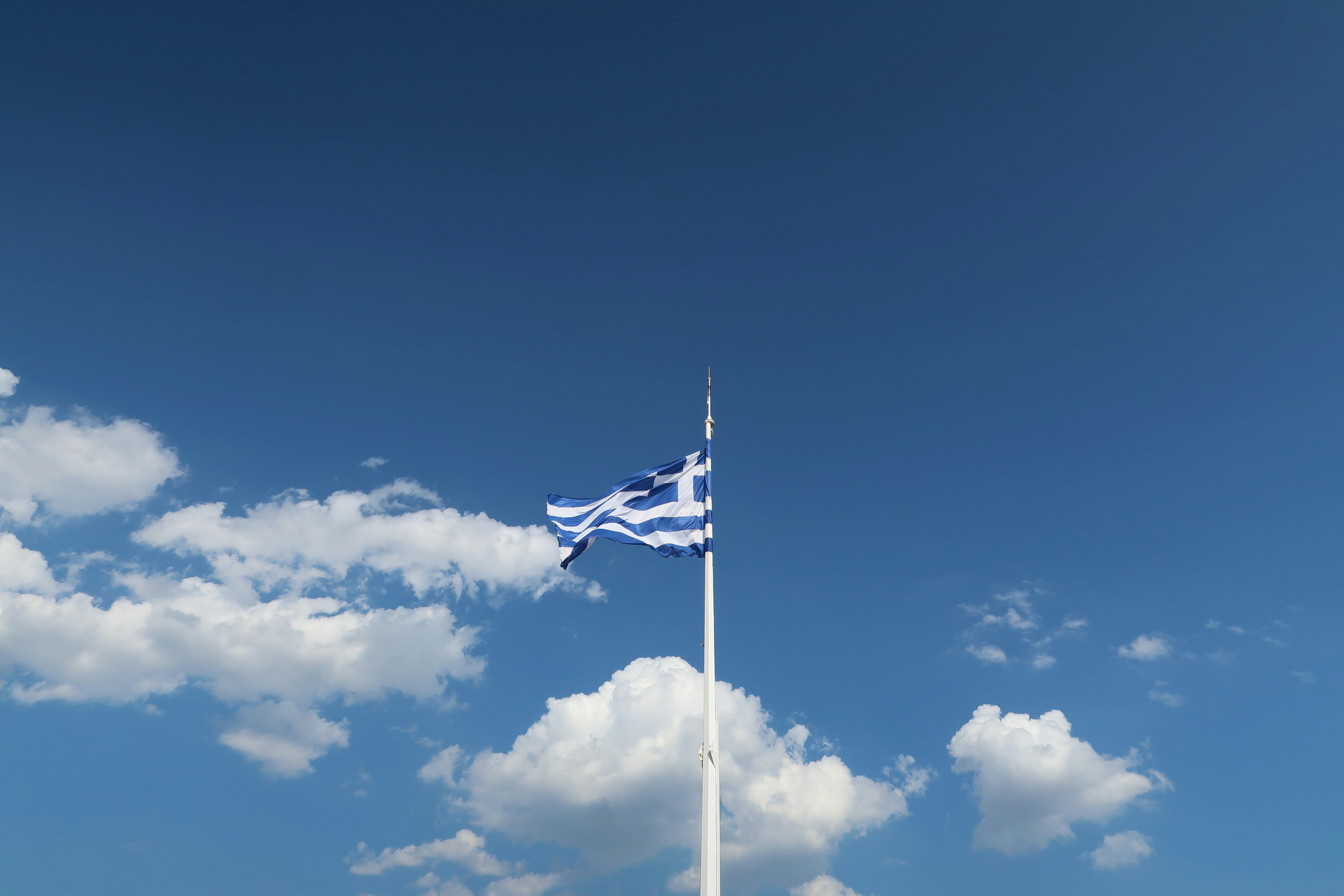 Blue Flag Against a Wide Wedge of Sky