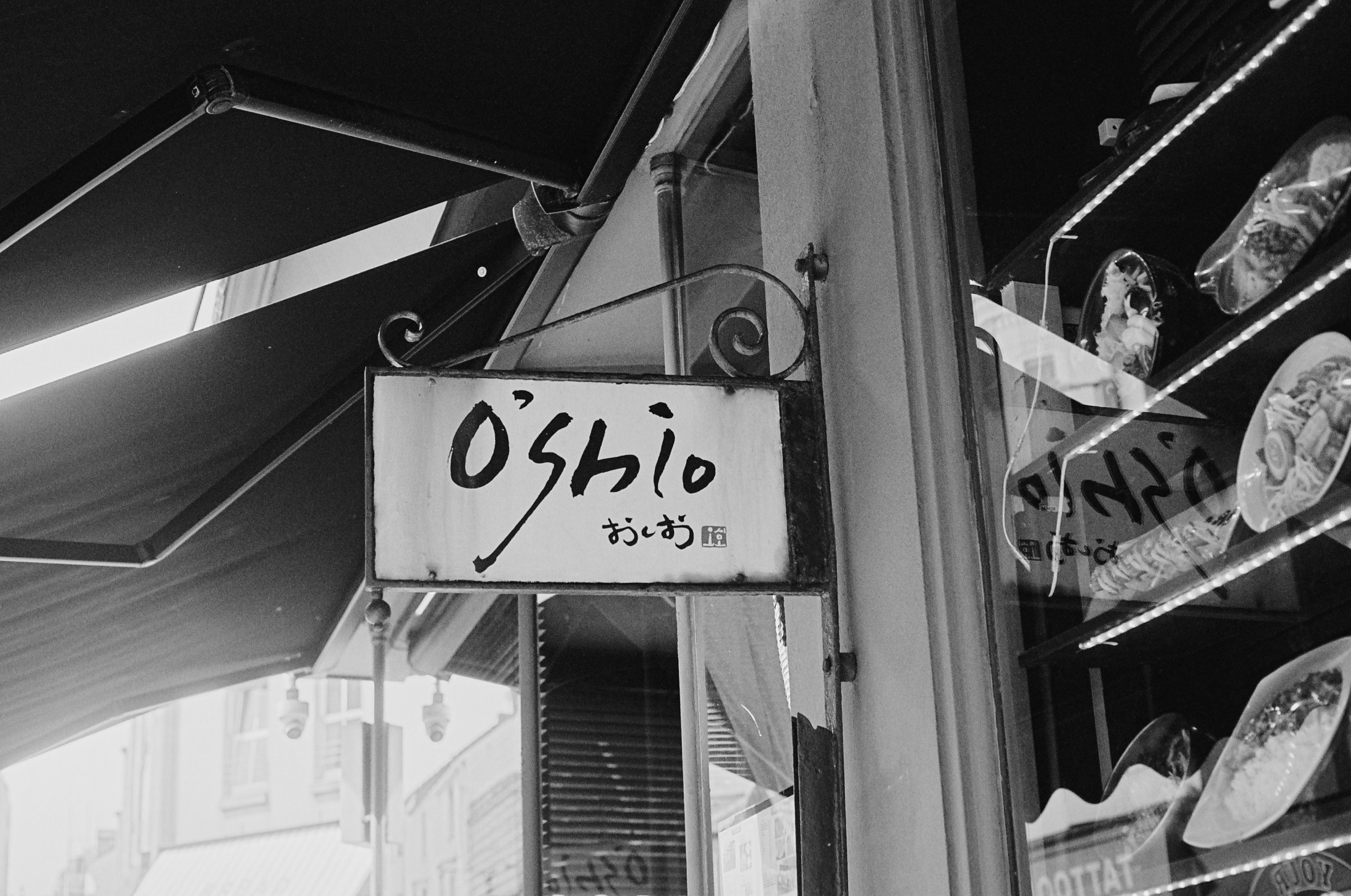 O'shio shop sign in black and white. photo – Free Sushi Image on Unsplash