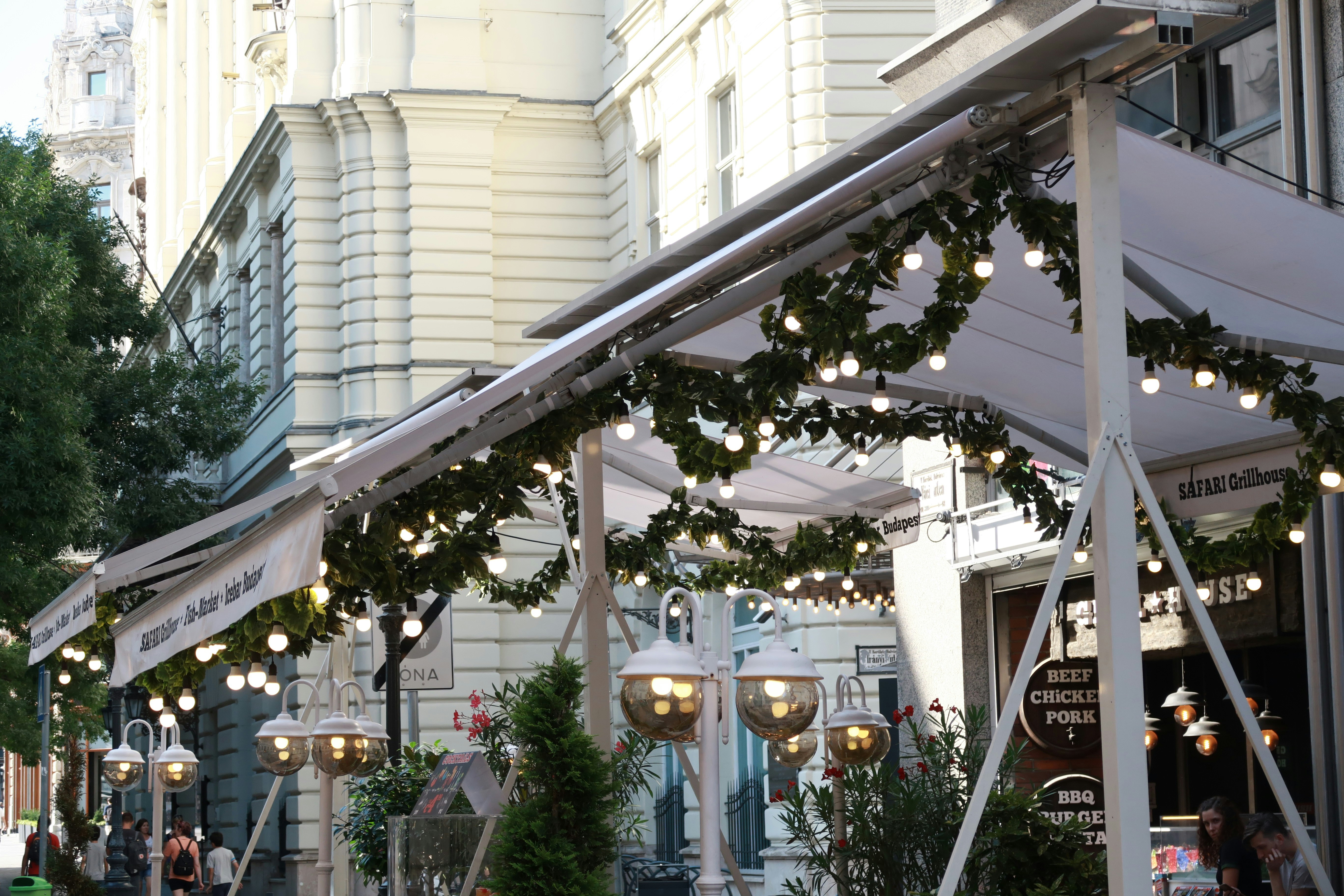Gondola of Light and Lanterns Under an Urban Truss