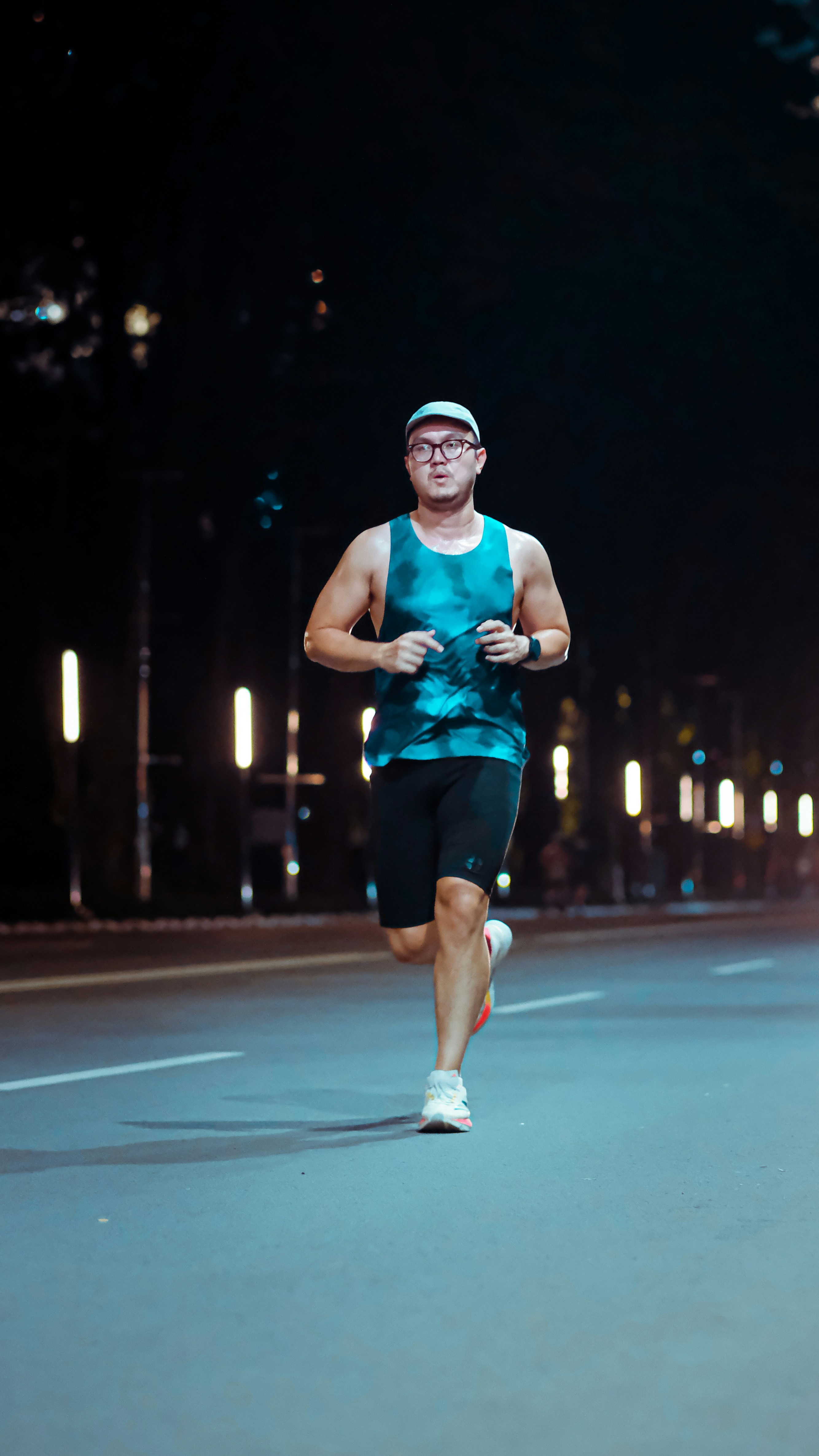 Night Run: Neon-lit Street Streamlines a Focused Runner