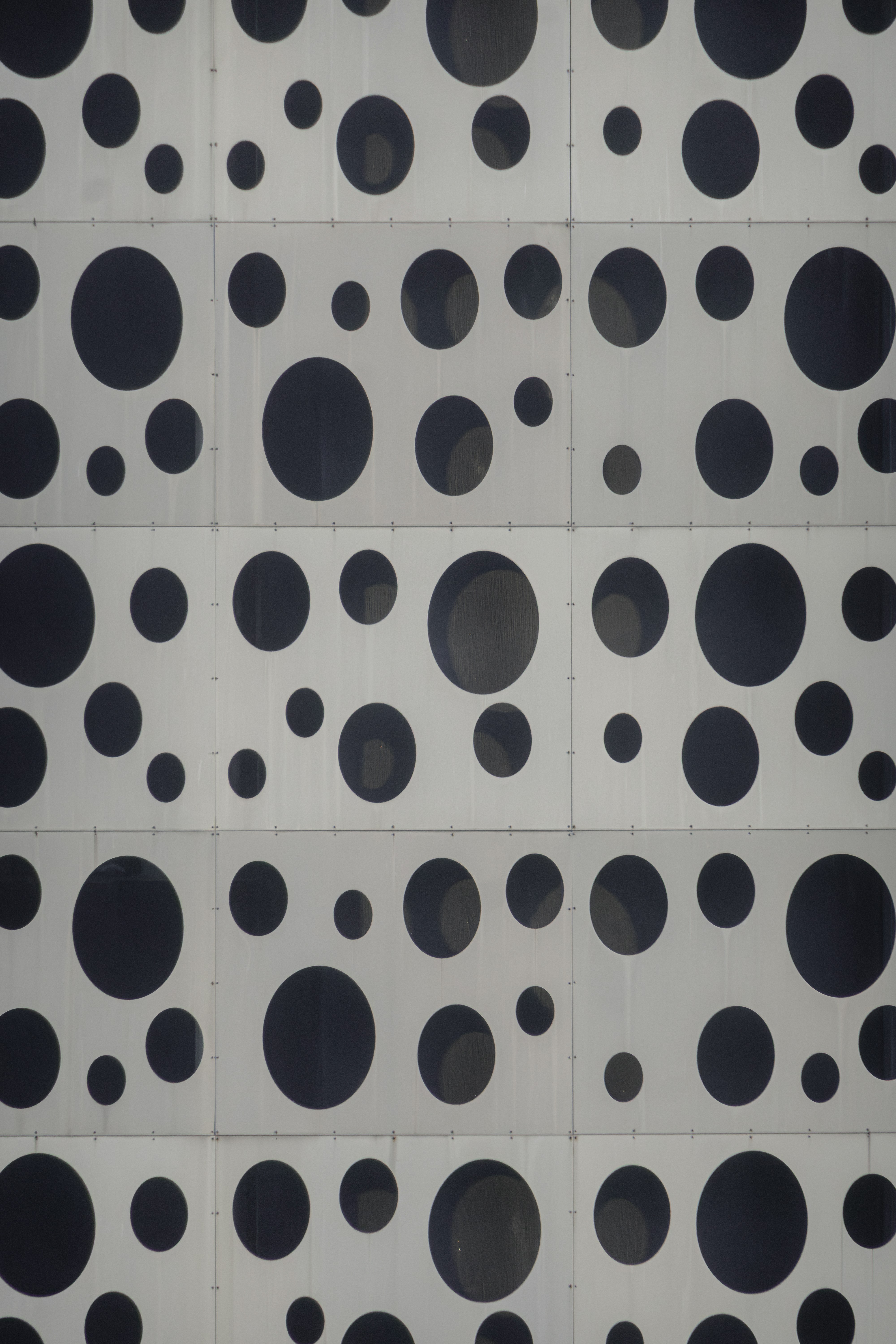 Dots in a Facade: A Perforated Wall of Circles