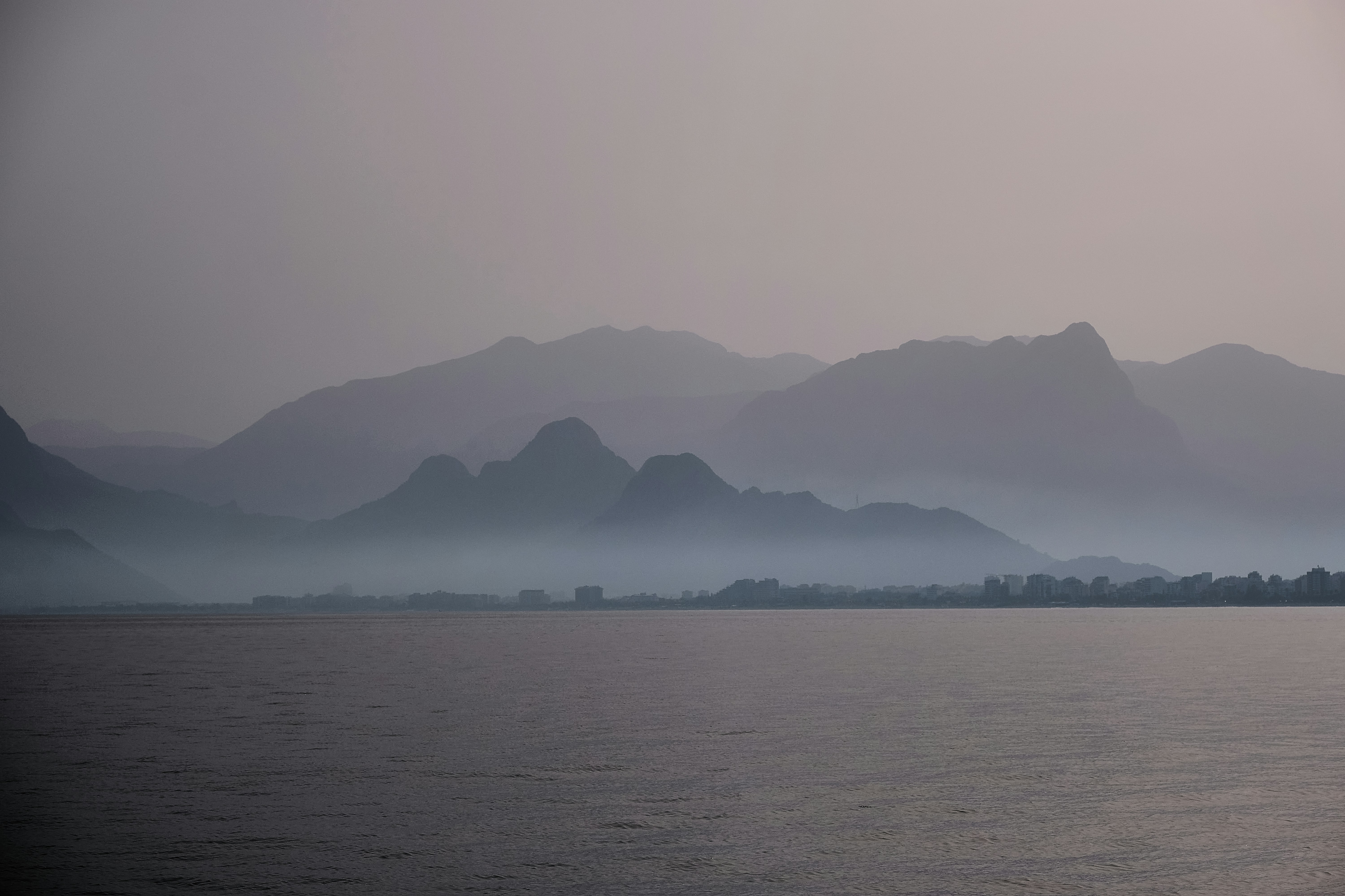 Mist-Laced Horizon Over the Quiet Bay