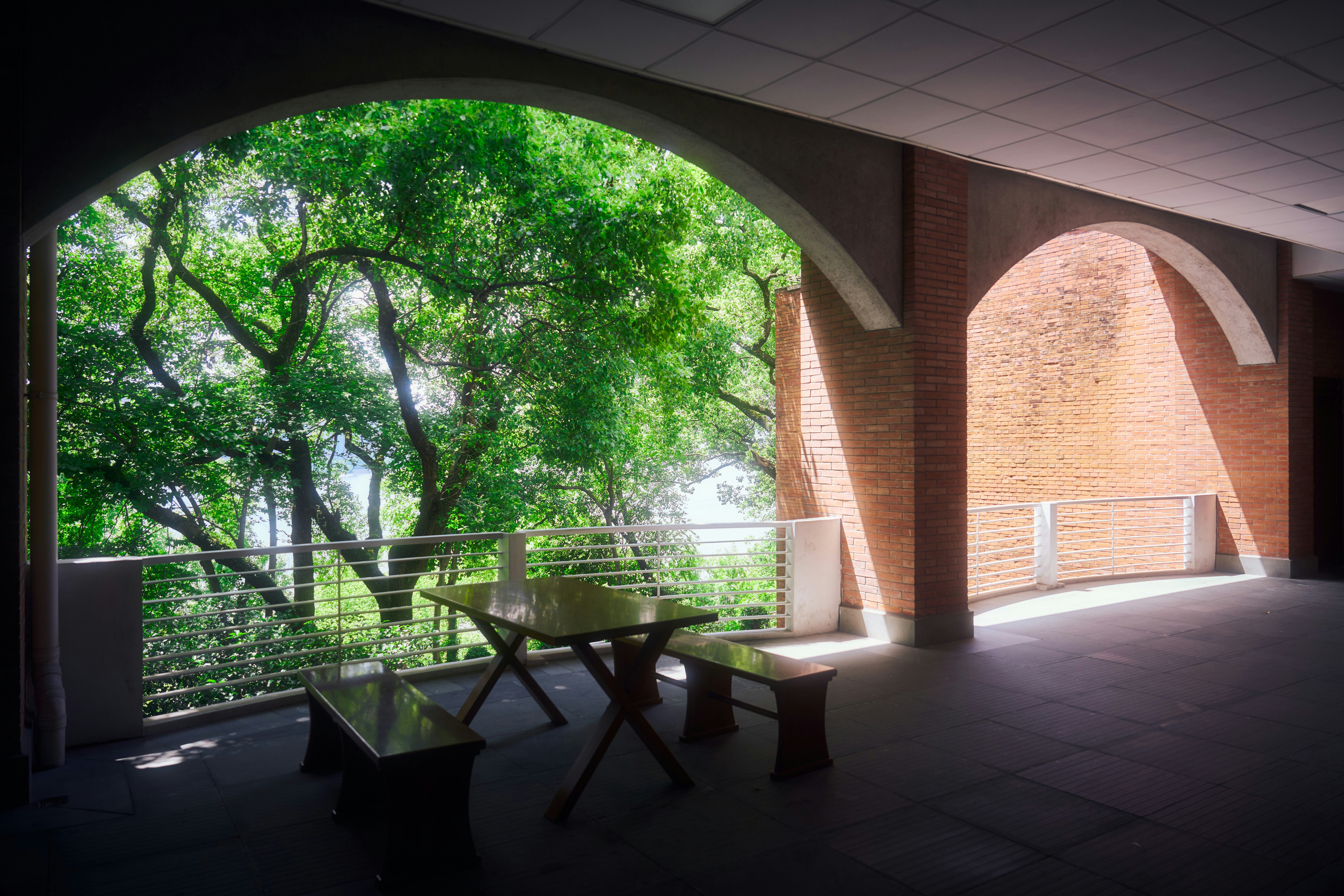 Shaded Terrace Overlooking a Verdant Archway