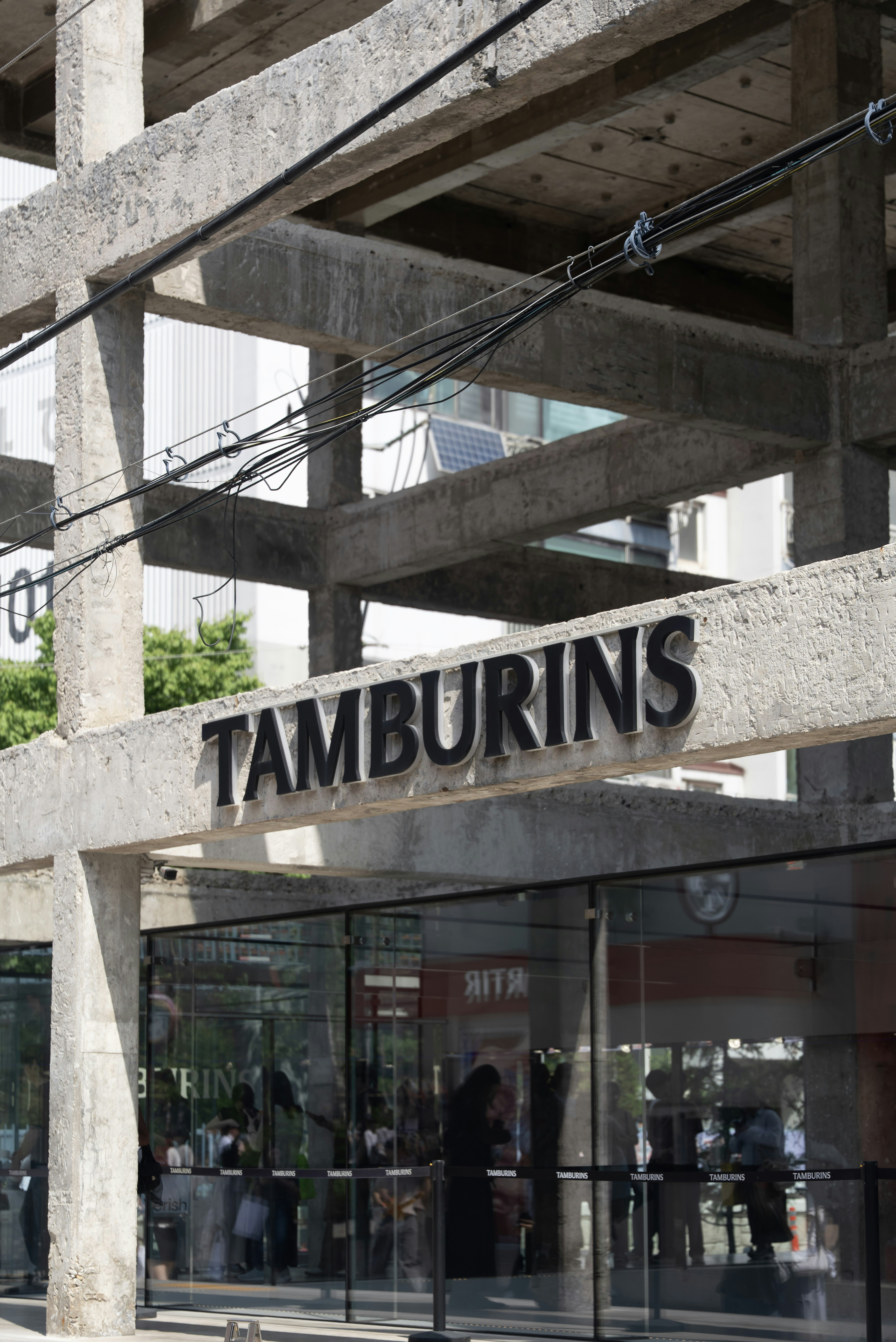 Concrete Frame and Tambourins Sign: Urban Structure Meets Public Space
