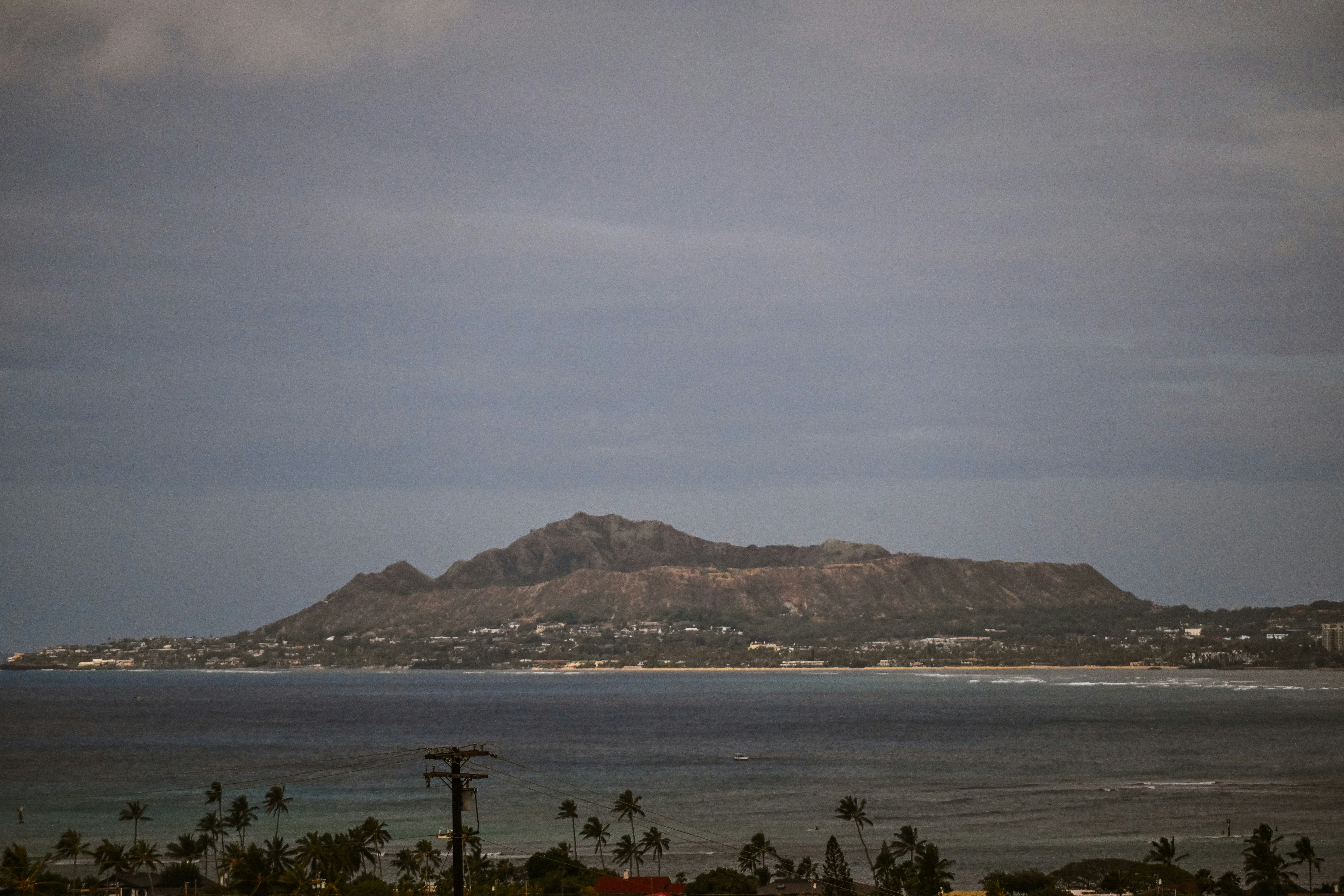 Island Against the Horizon: A Quiet Volcanic Ridge across the Sea