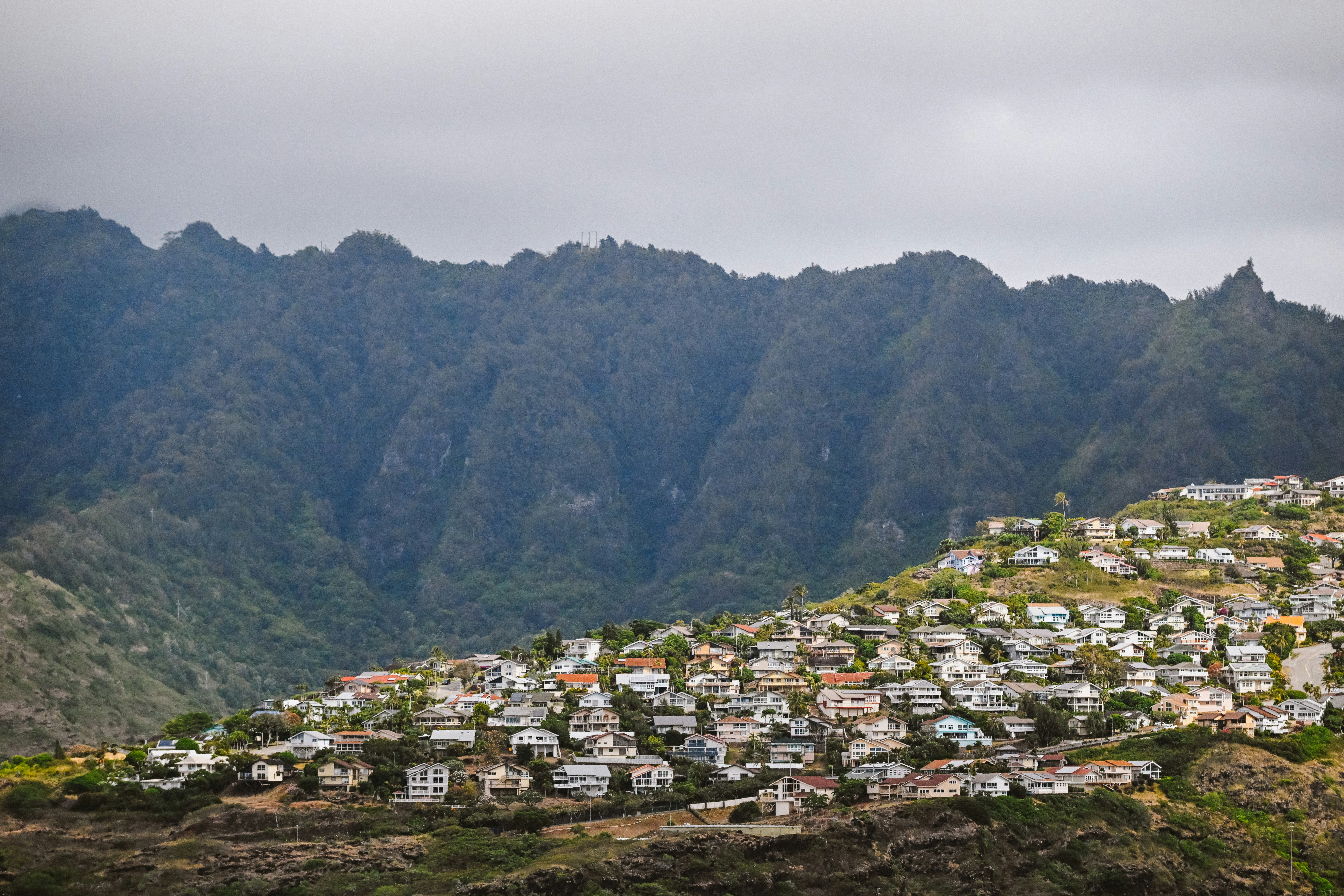 Terraced hillside village under a rolling canyon