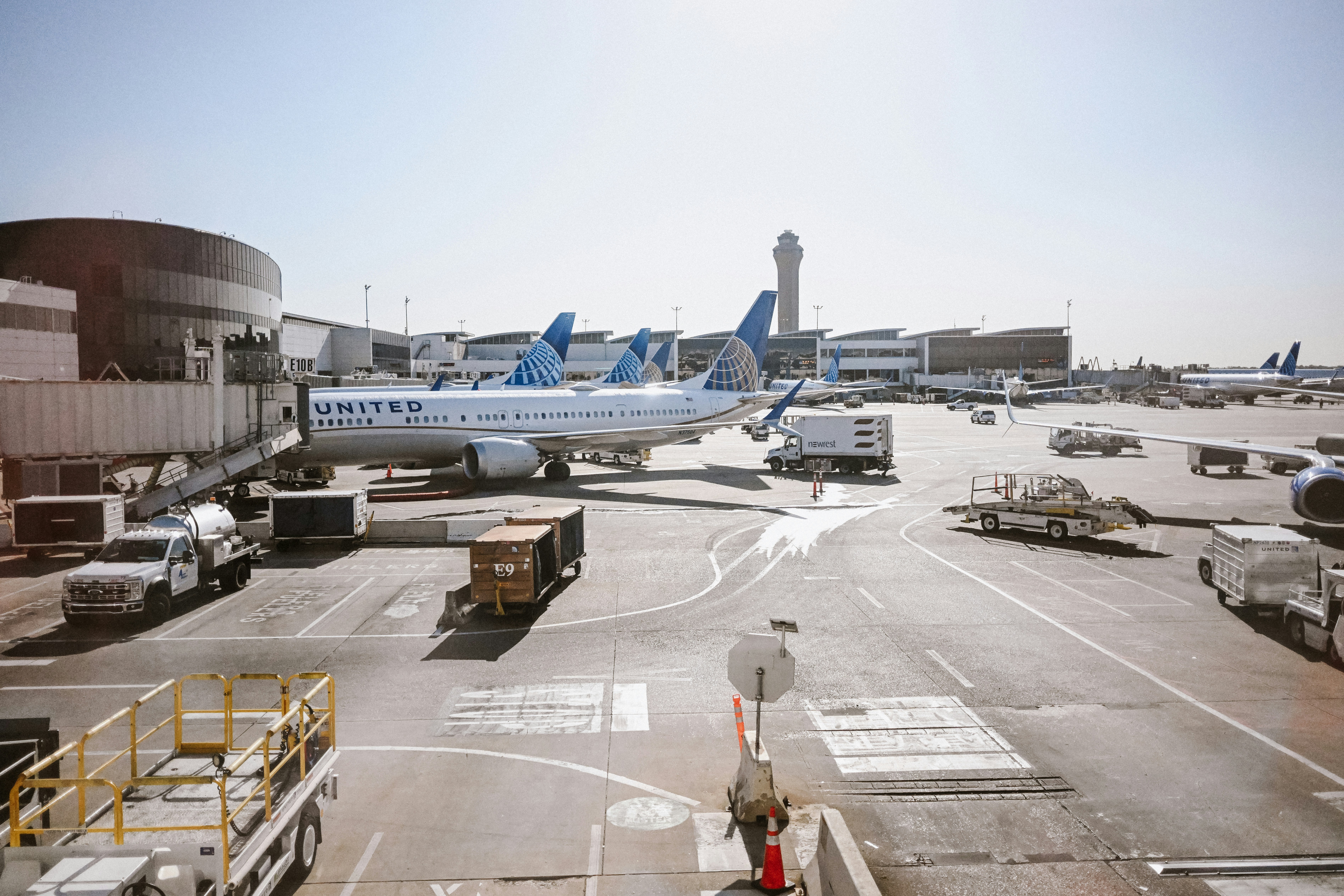 Gateways to the Sky: A Sunrise Tarmack with United Airlines JETS