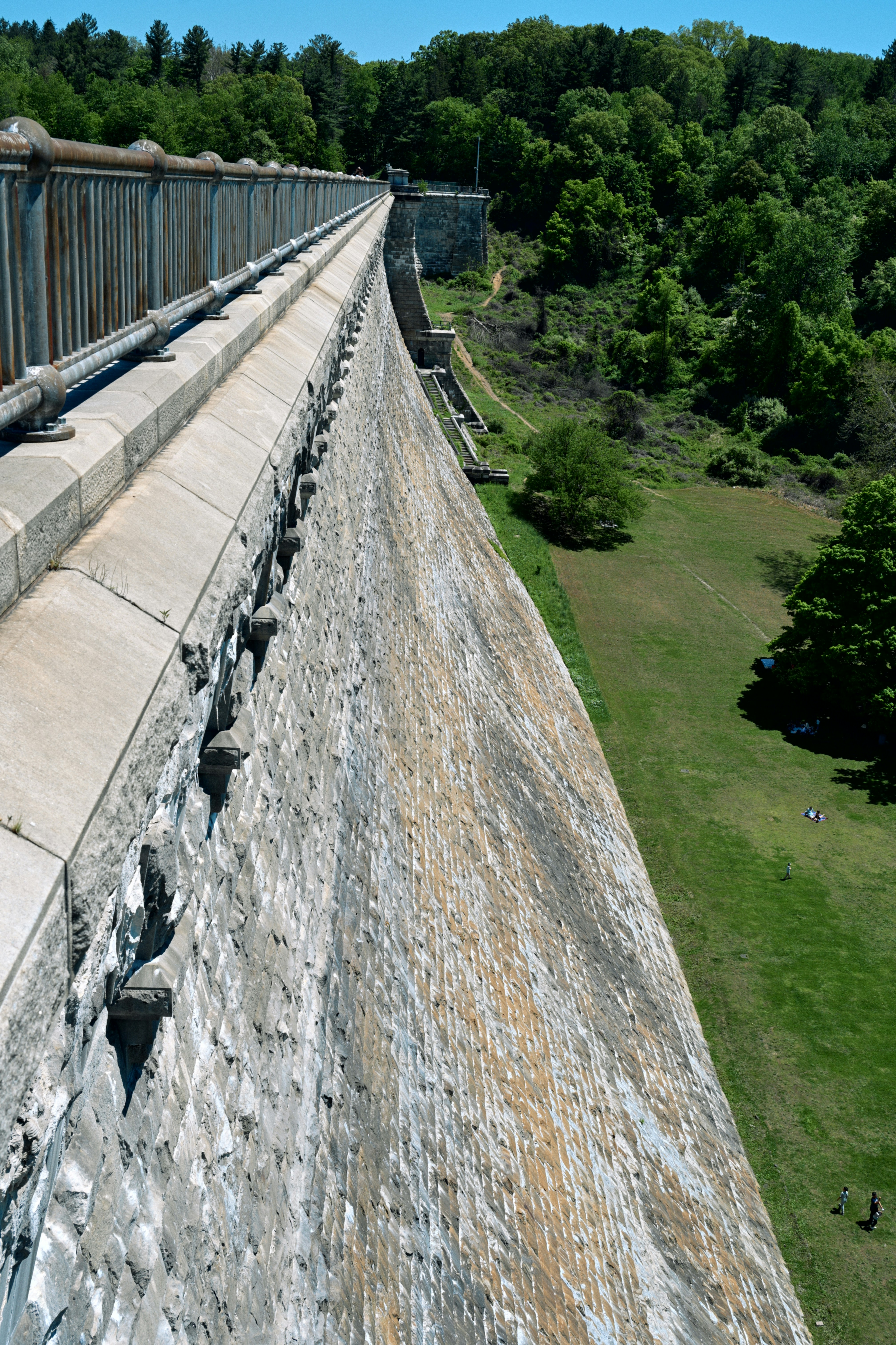 Edge of the Dam: A Leaning Perspective toward the Crest