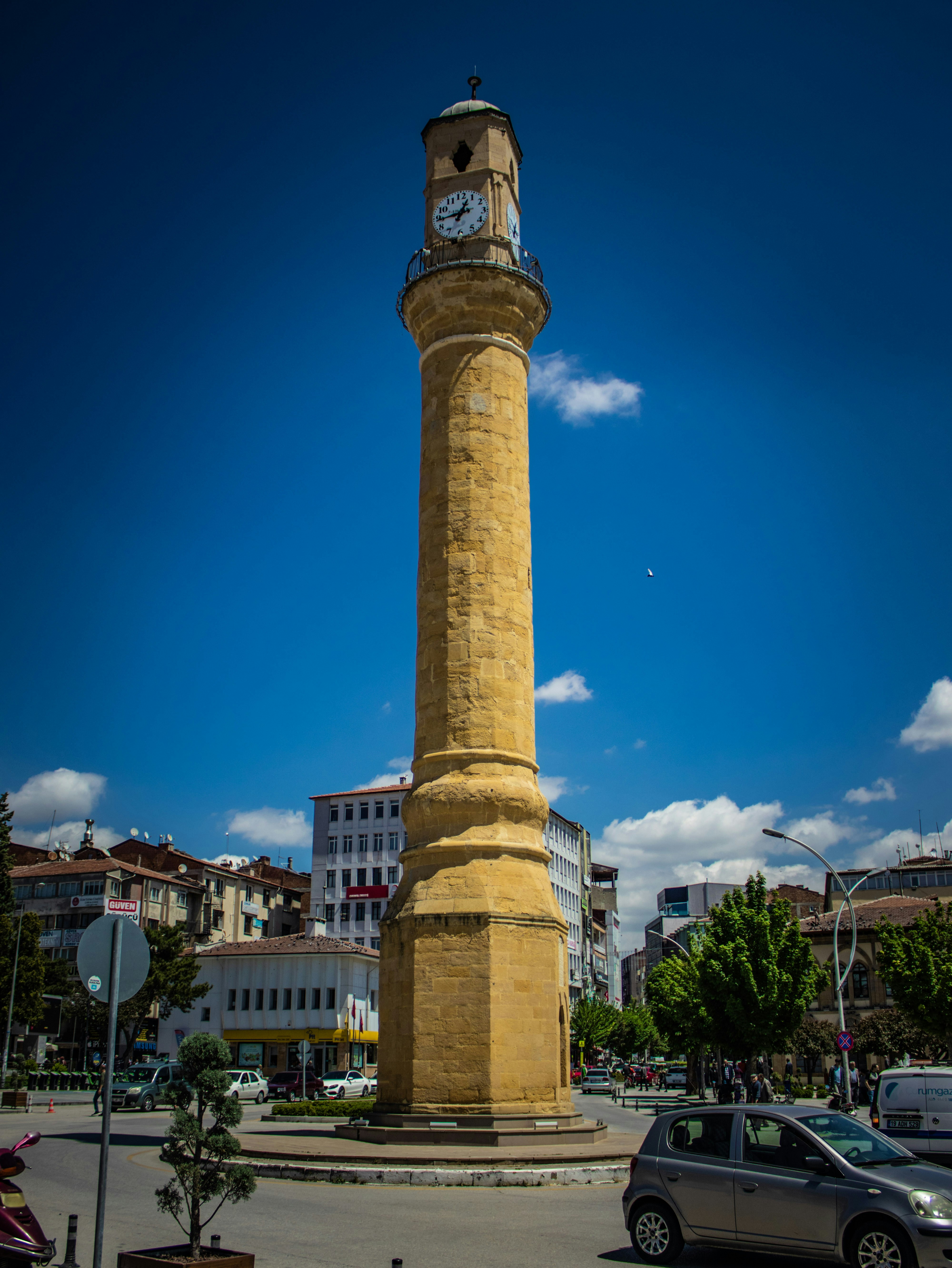Clocktower Rising Over a Sunny City Square