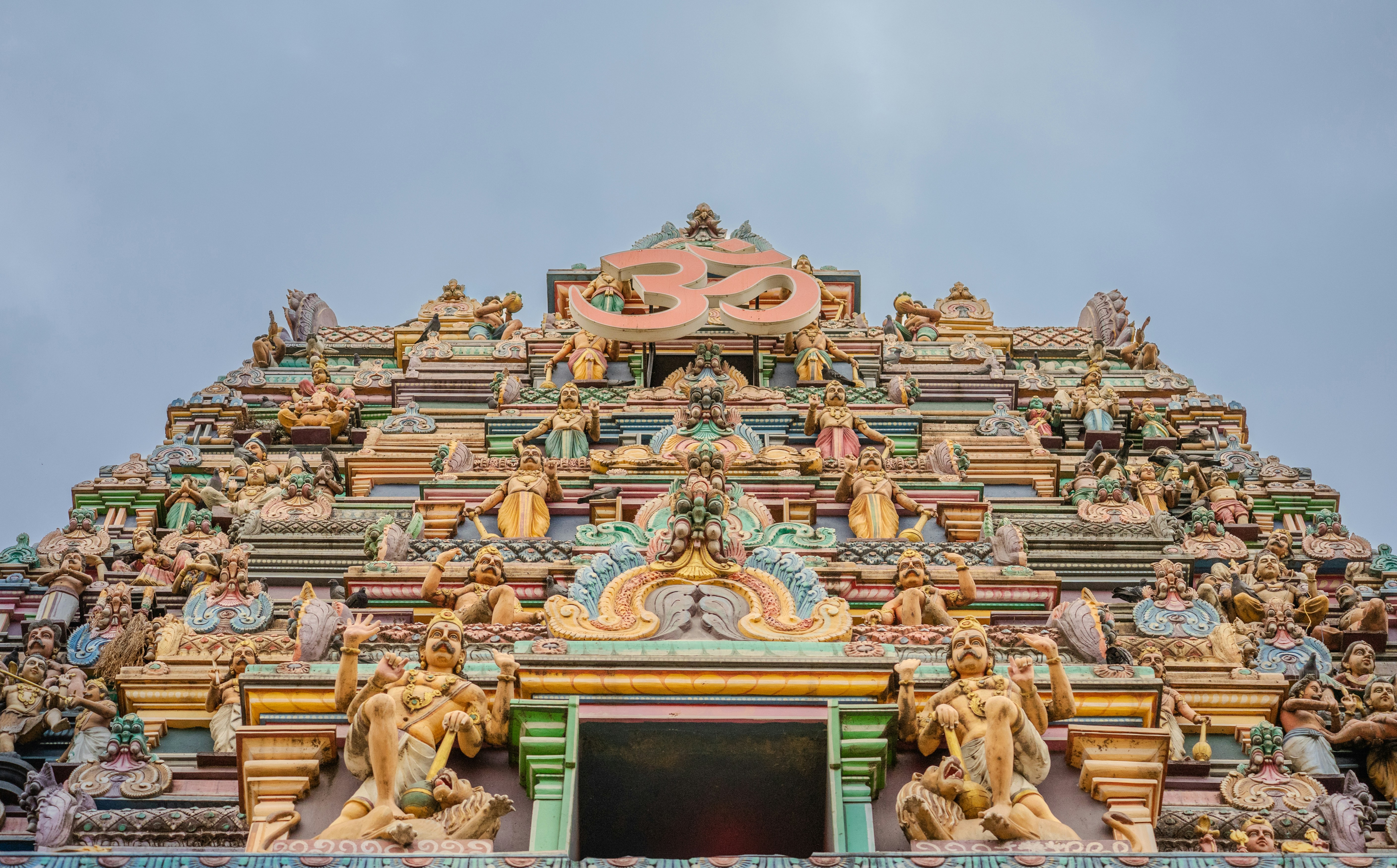 Ornate Gopuram Crowned with Cosmic Friezes
