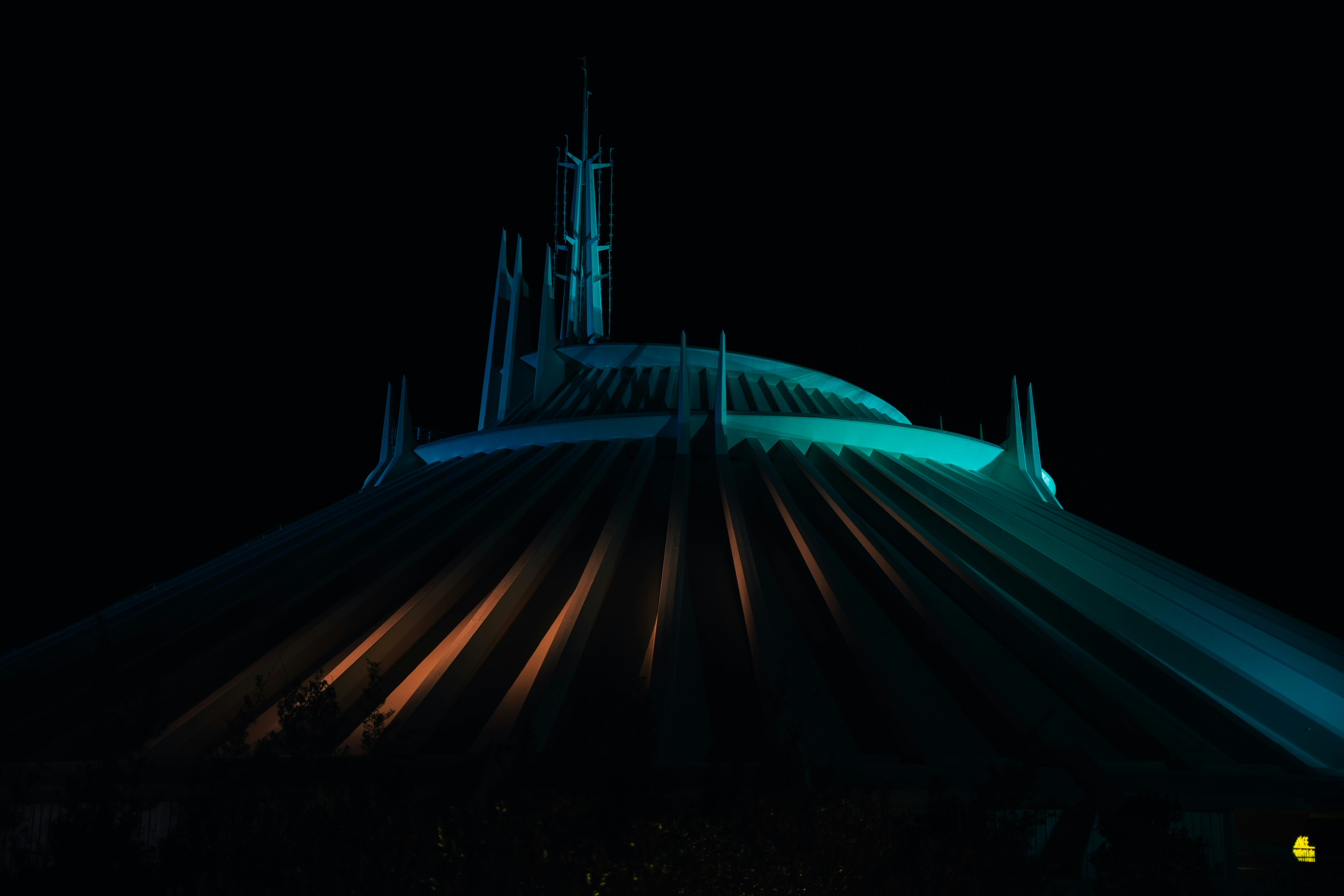 Dune Pavilion: Neon Spires Radiating from the Dark