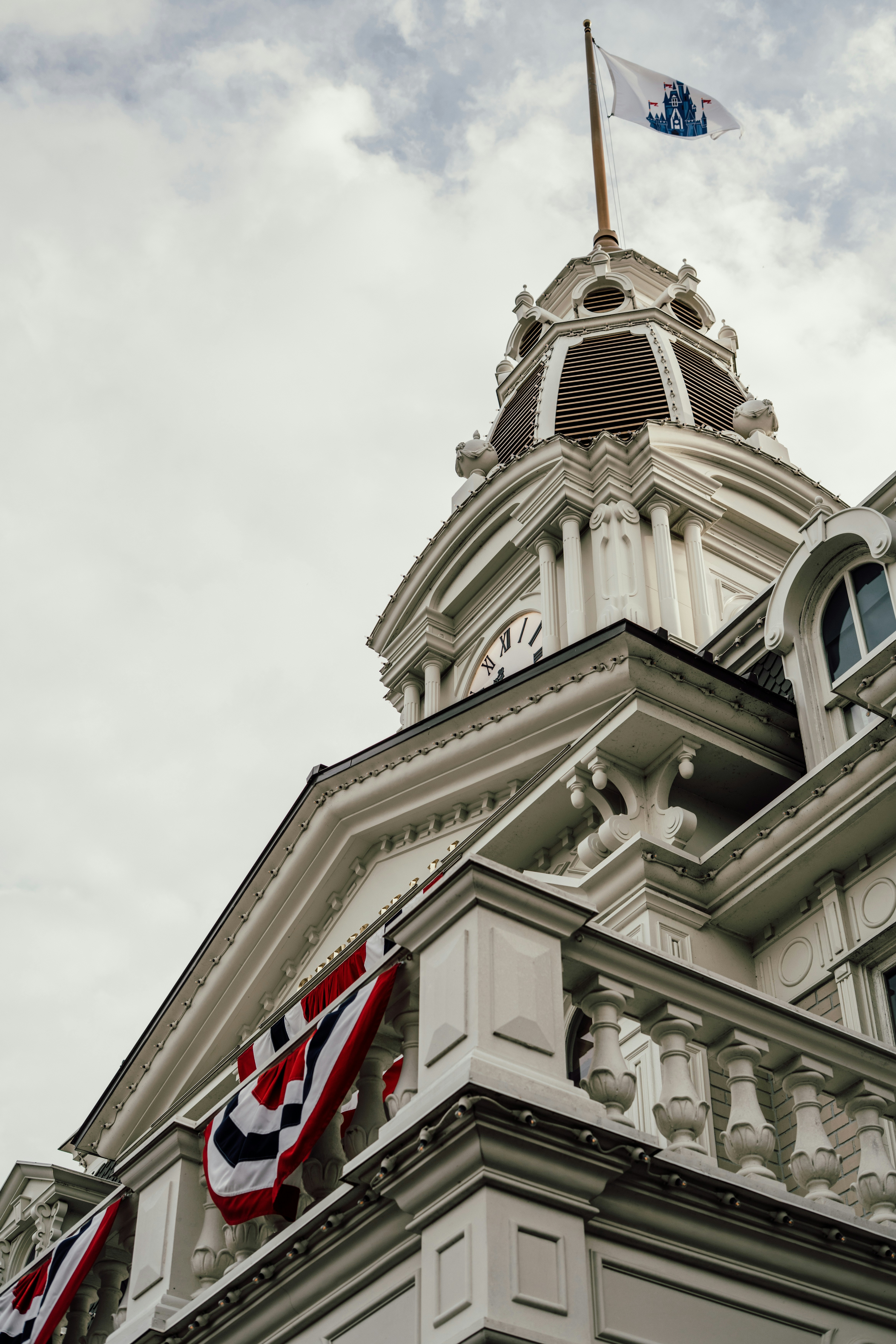 Clock Tower in Focus: A Graced Facade with Bannered Detail