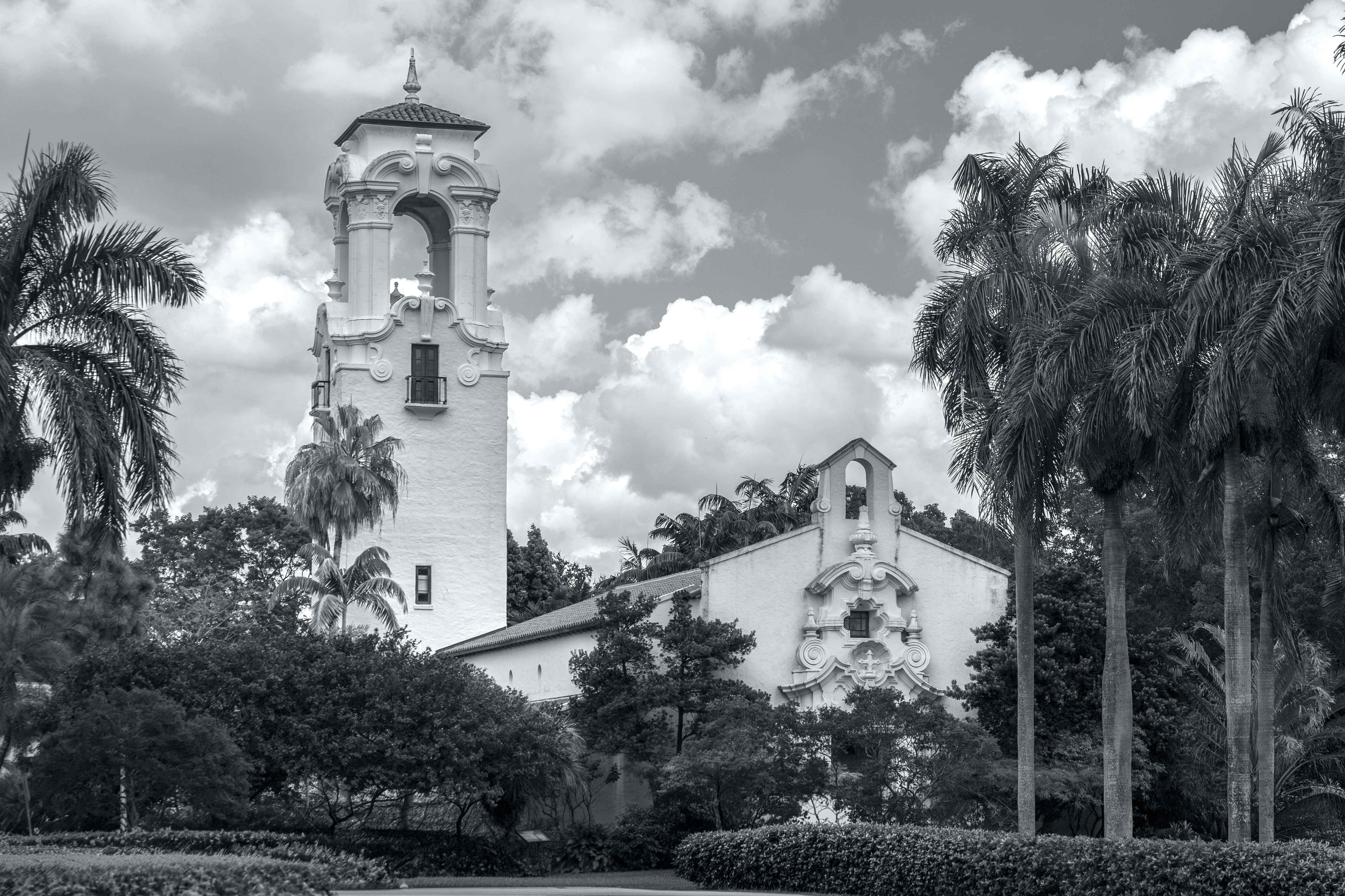 Quiet Mission Bell: A Colonial Clocktower with Framing Palm Shadows
