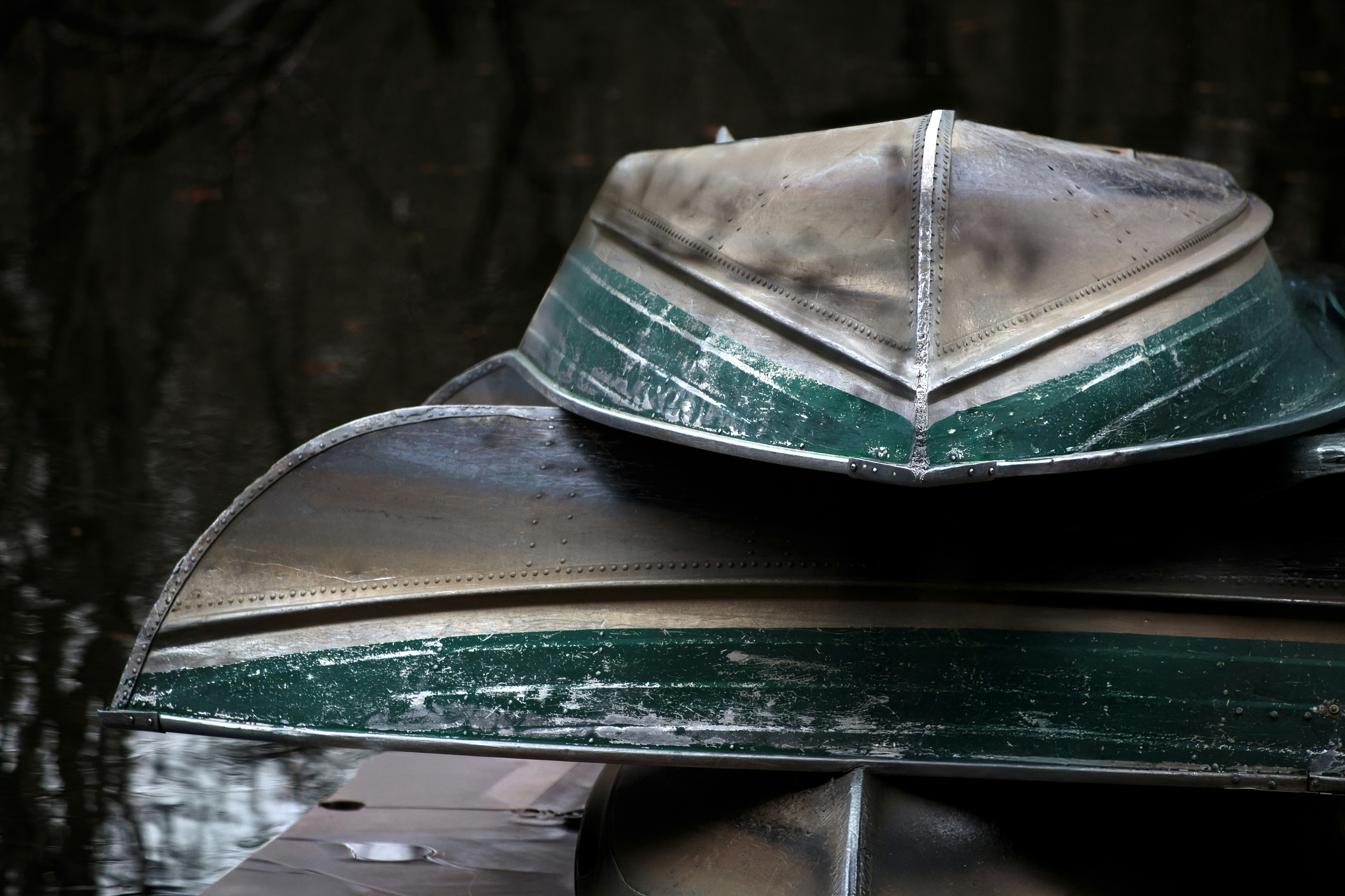 Layered Dusk: Weathered Boats at Rest by Quiet Water