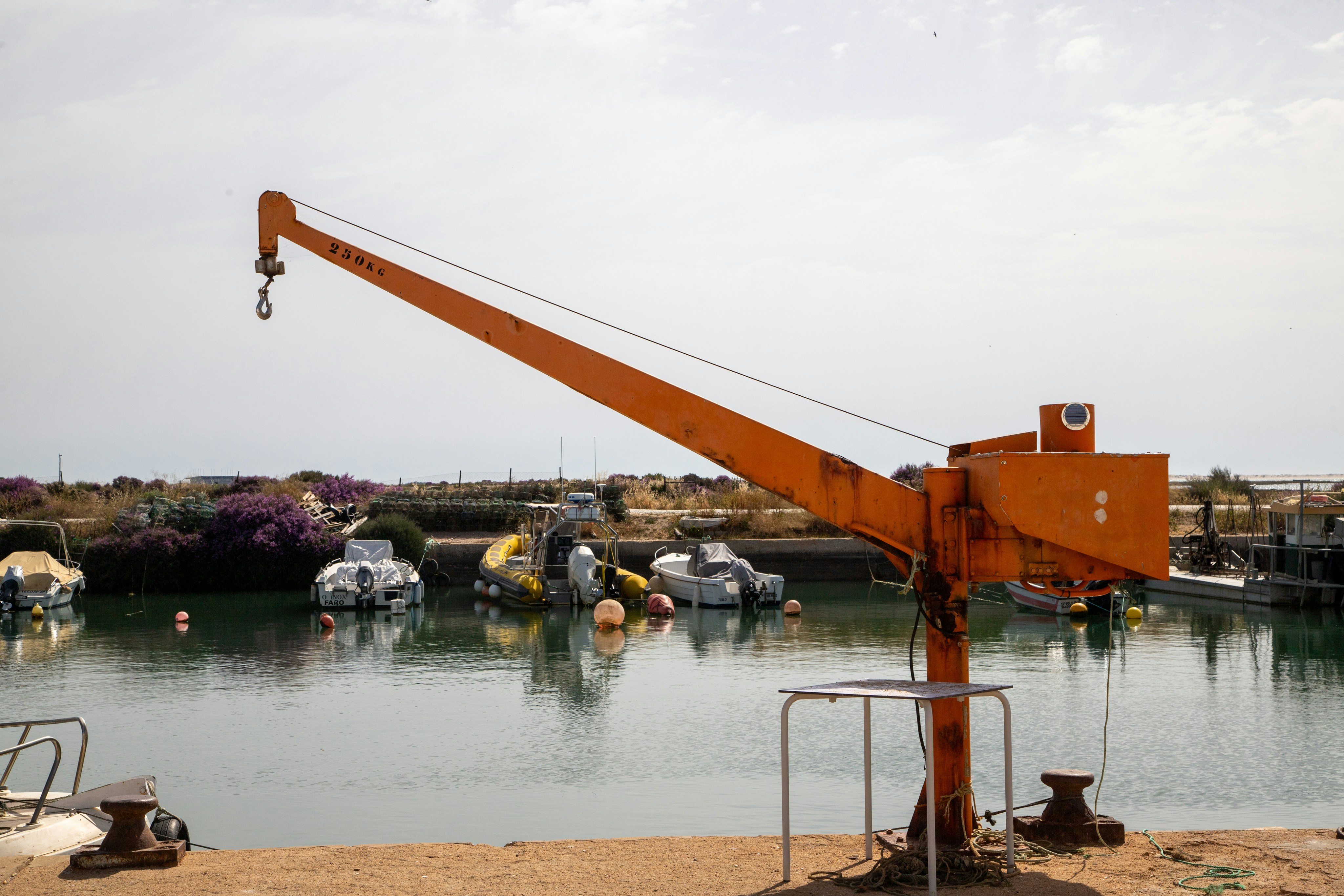 Harbor Crane at Rest: A Quiet Coastal Machinery Scene