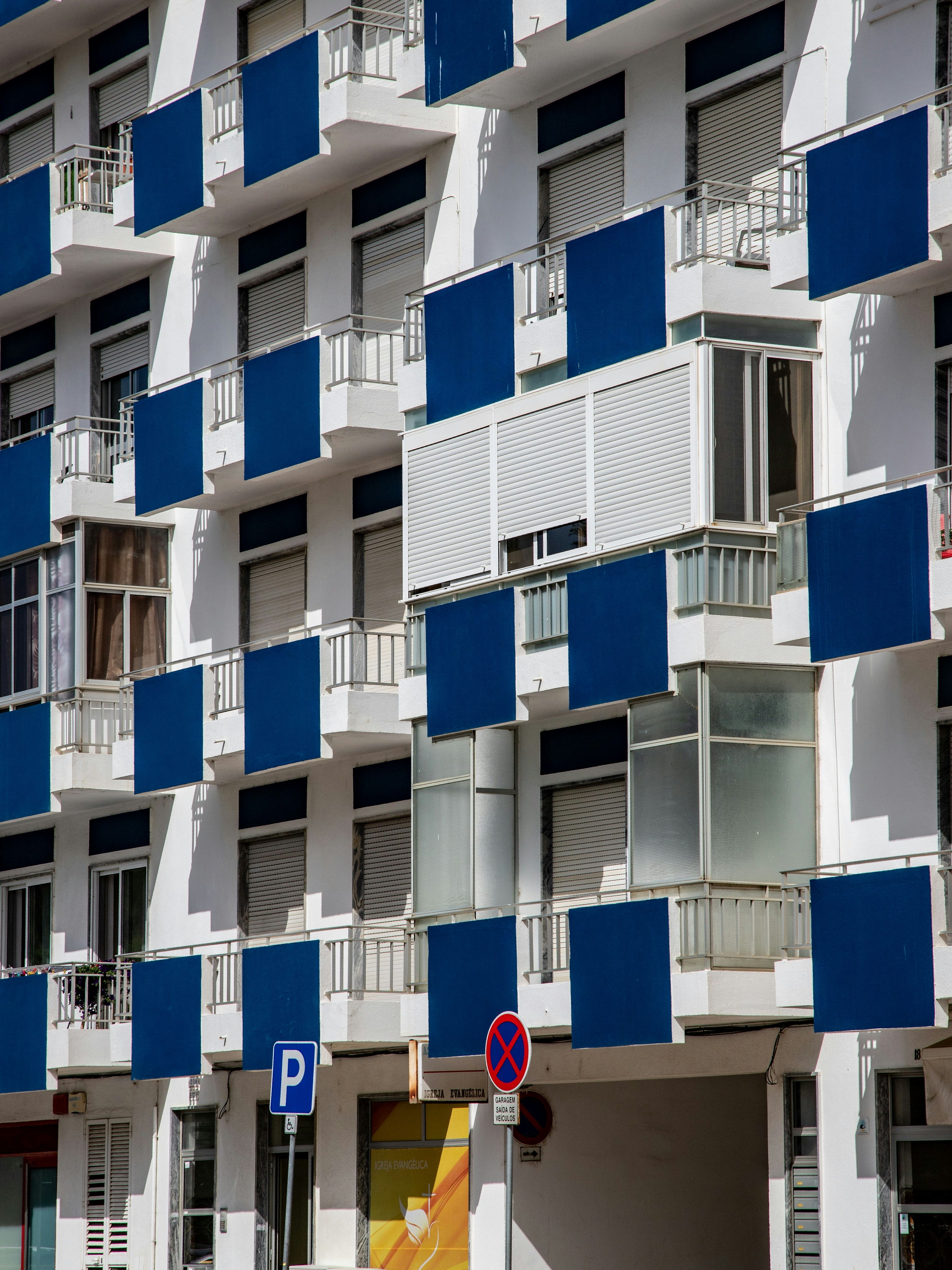 Urban Quilt: A Faceted Facade of Blue and White
