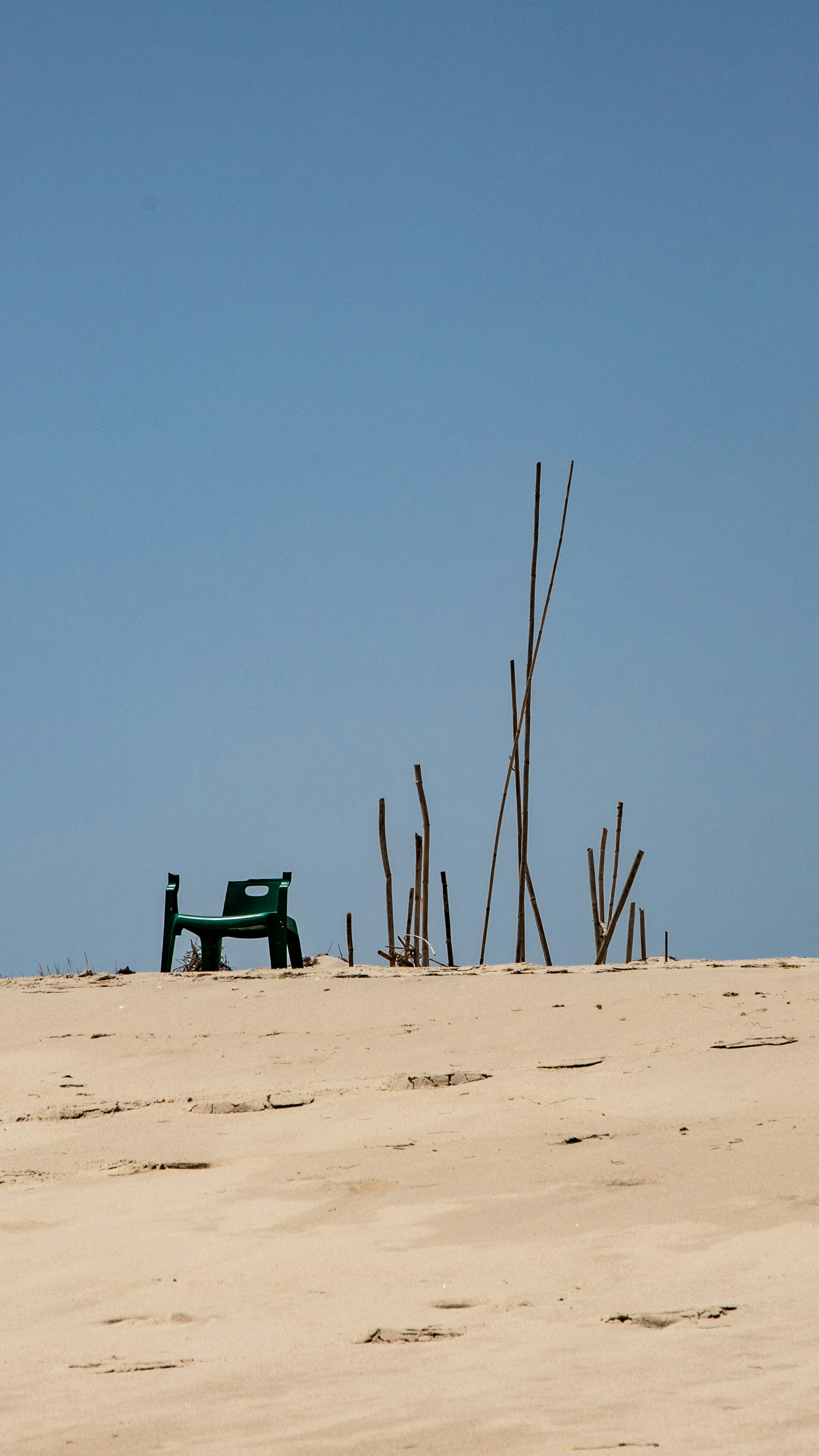 Lonely Chair on a Quiet Dune