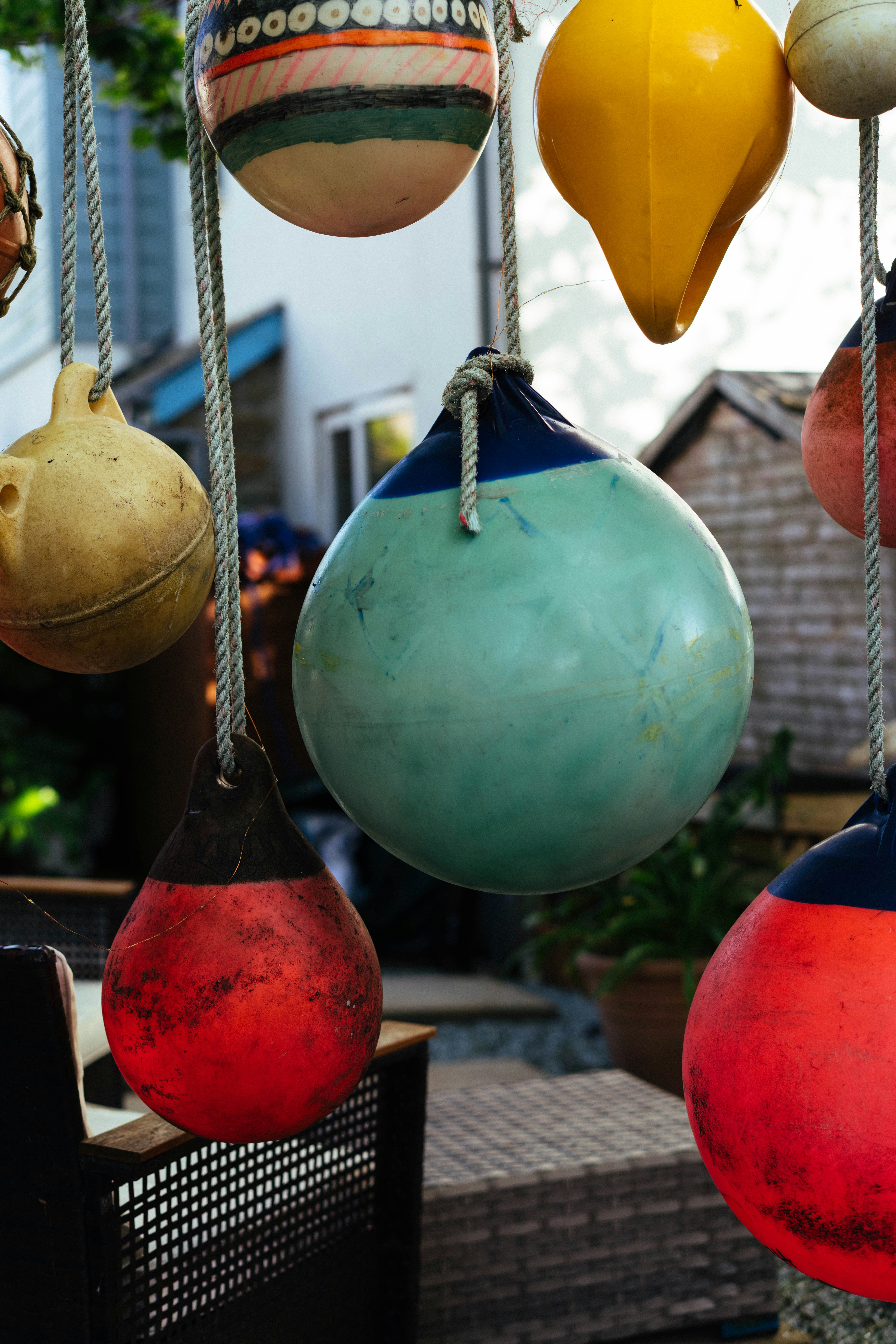 Suspended Orbs: A Sunlit Gallery of Floating Lanterns