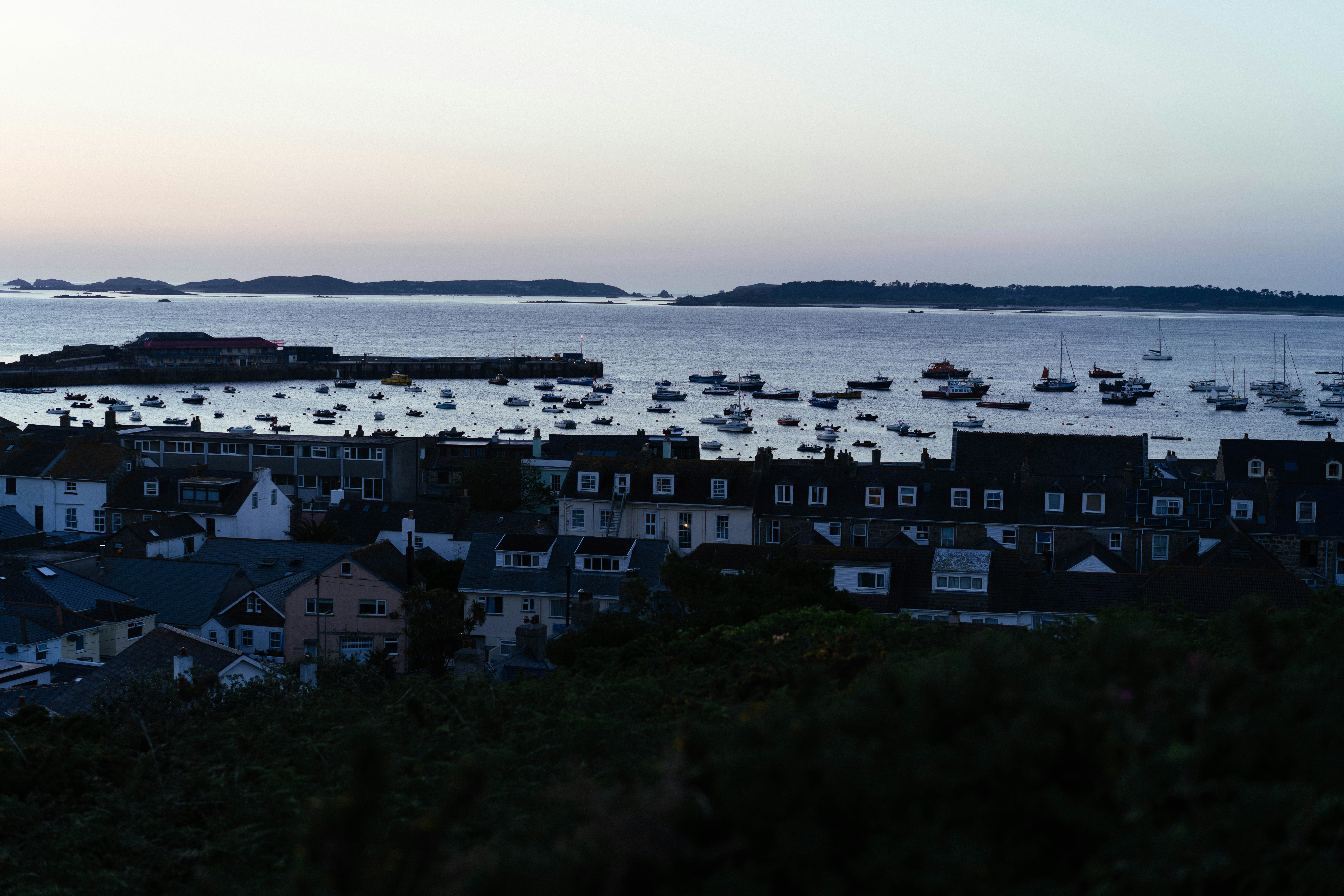 Harbor at Dusk: Quiet Boats and Rooftops