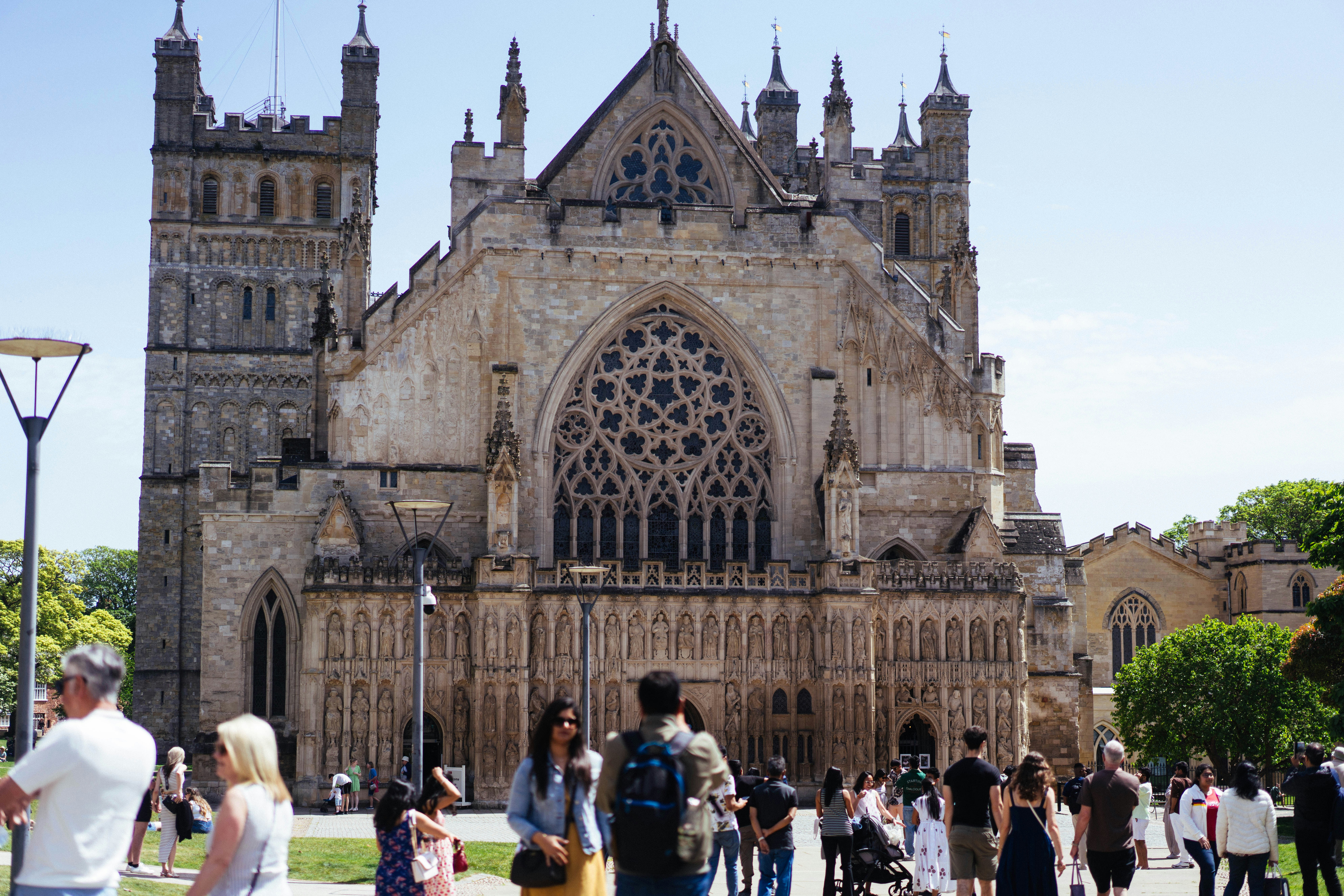 Crowd at a Gothic Cathedral Faces as Doors Open to Daylight