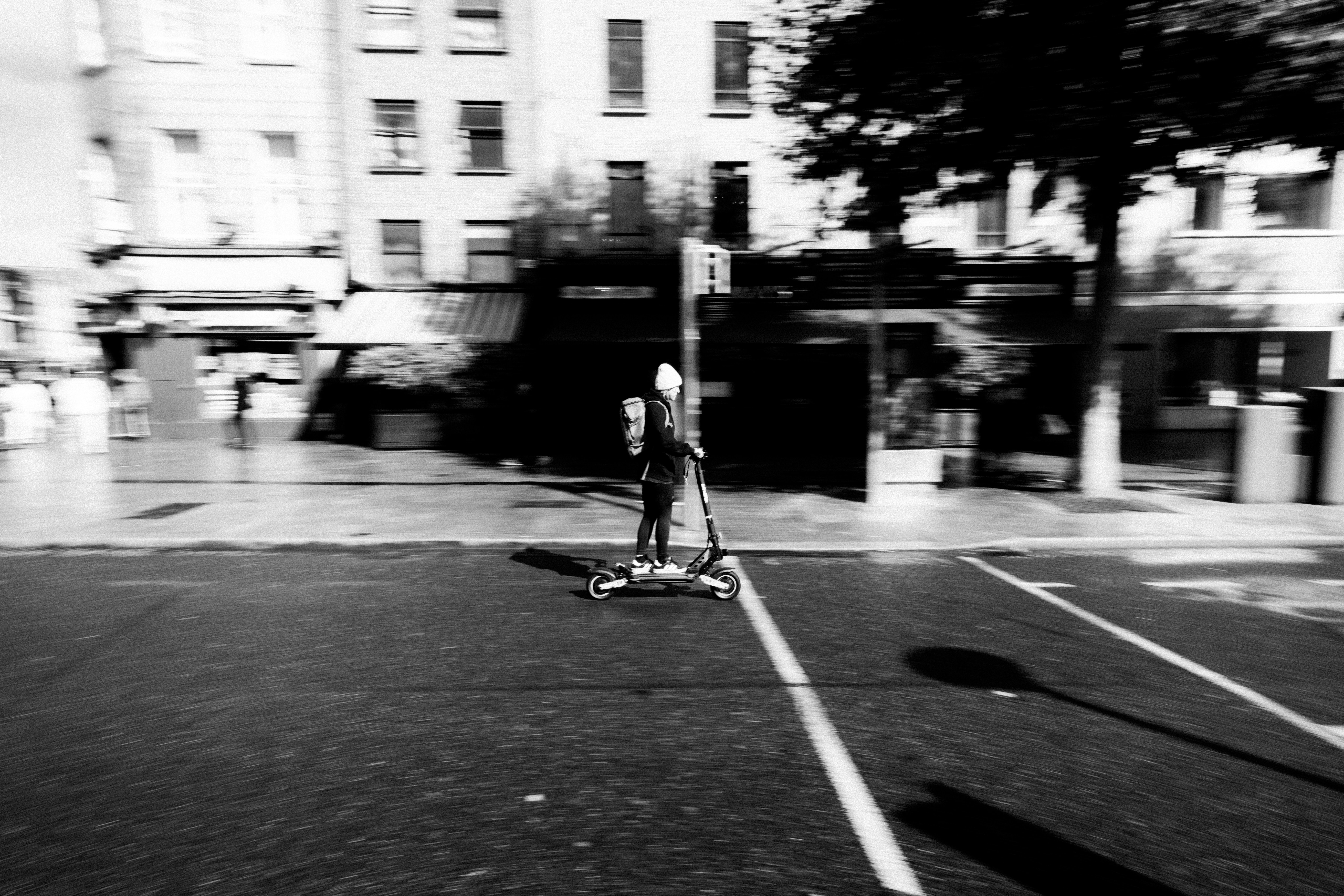 City Rider in Motion: A Solo Scooter Snapshot