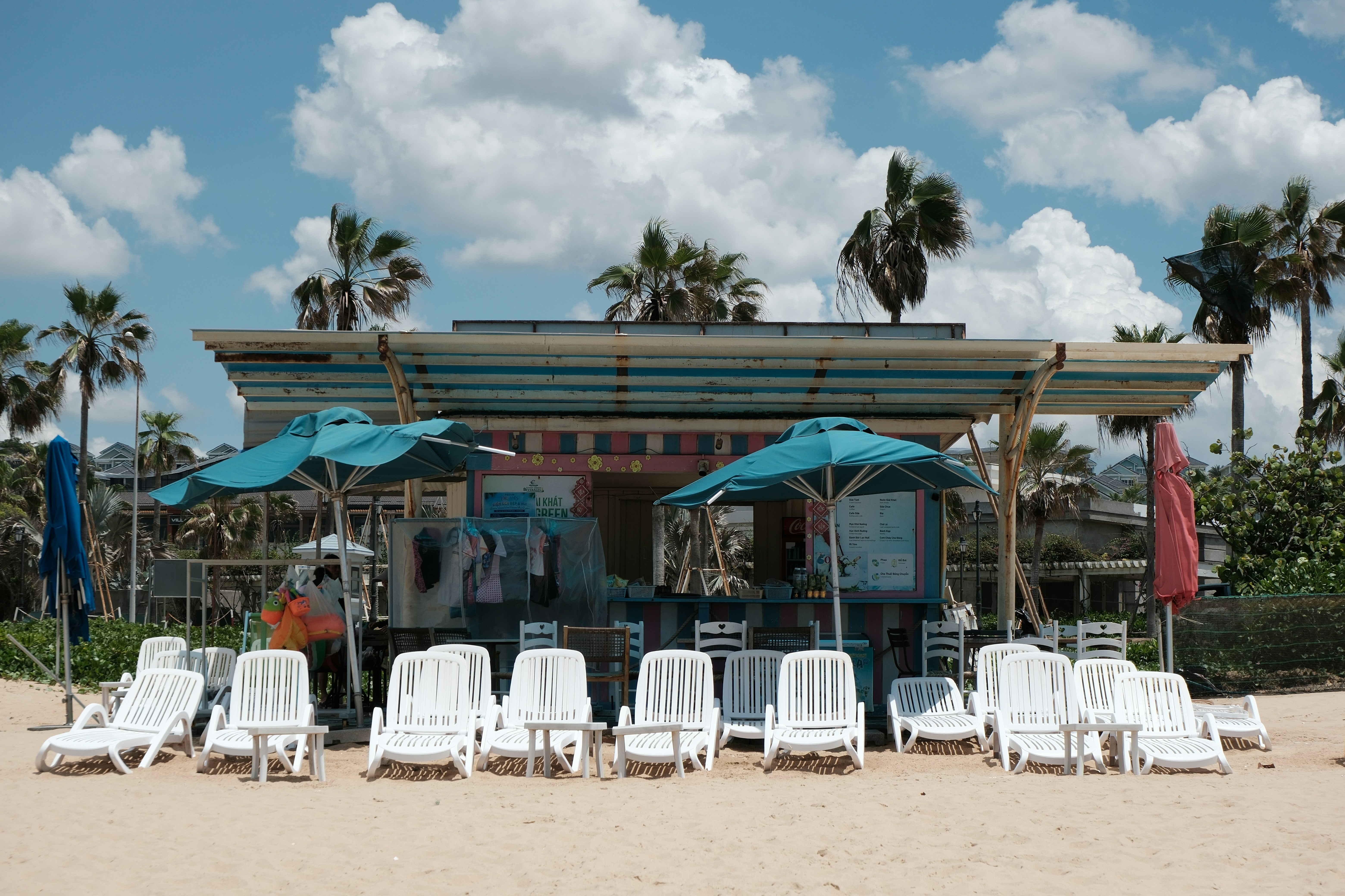 Beachfront Snack Stand Under Turquoise Sunshades