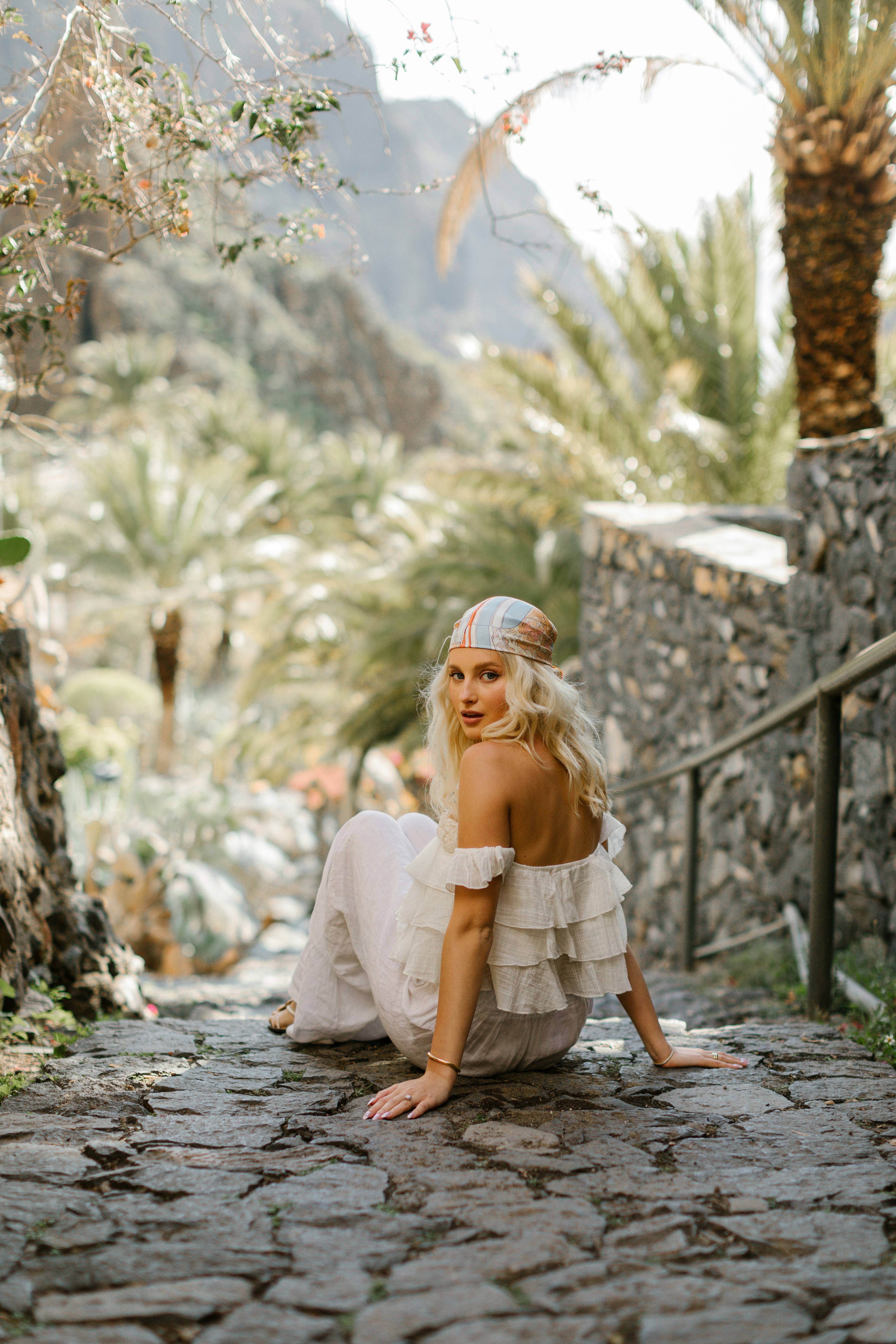 Golden hour portrait on a sunlit stone path