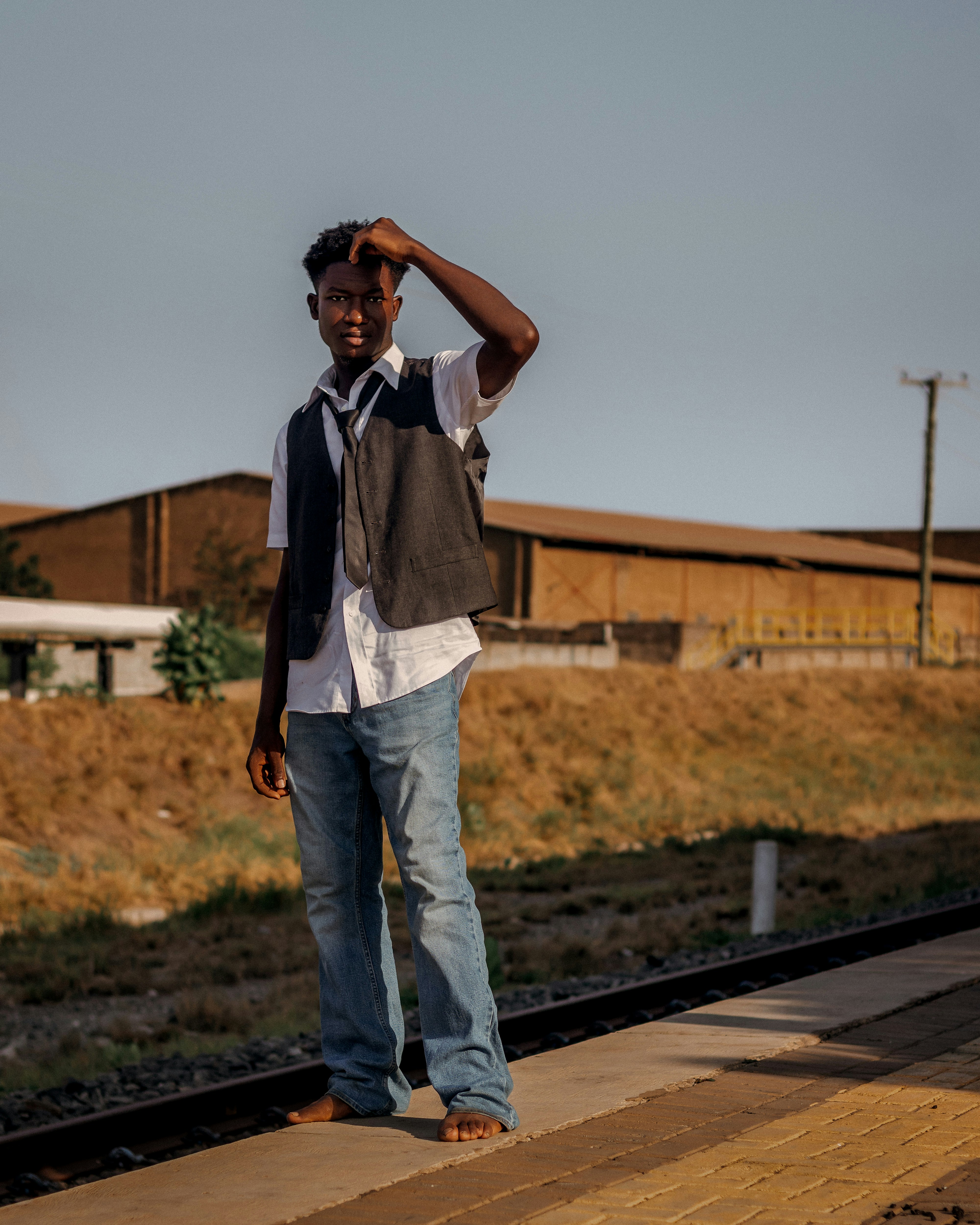 Youthful Outrider on a Quiet Platform