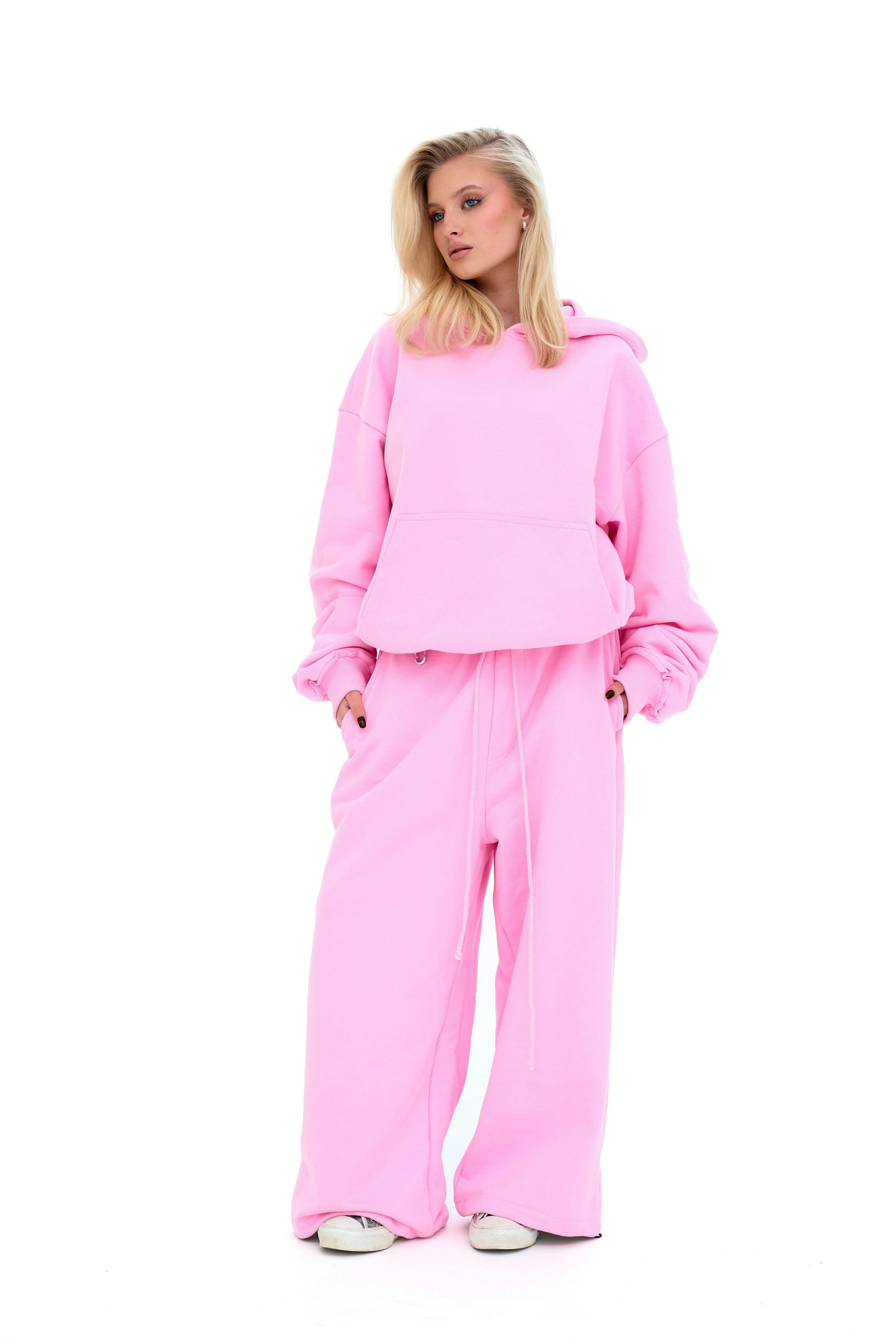 Soft Rose Hue: A Casual Vogue Portrait in a Plush Pink Tracksuit