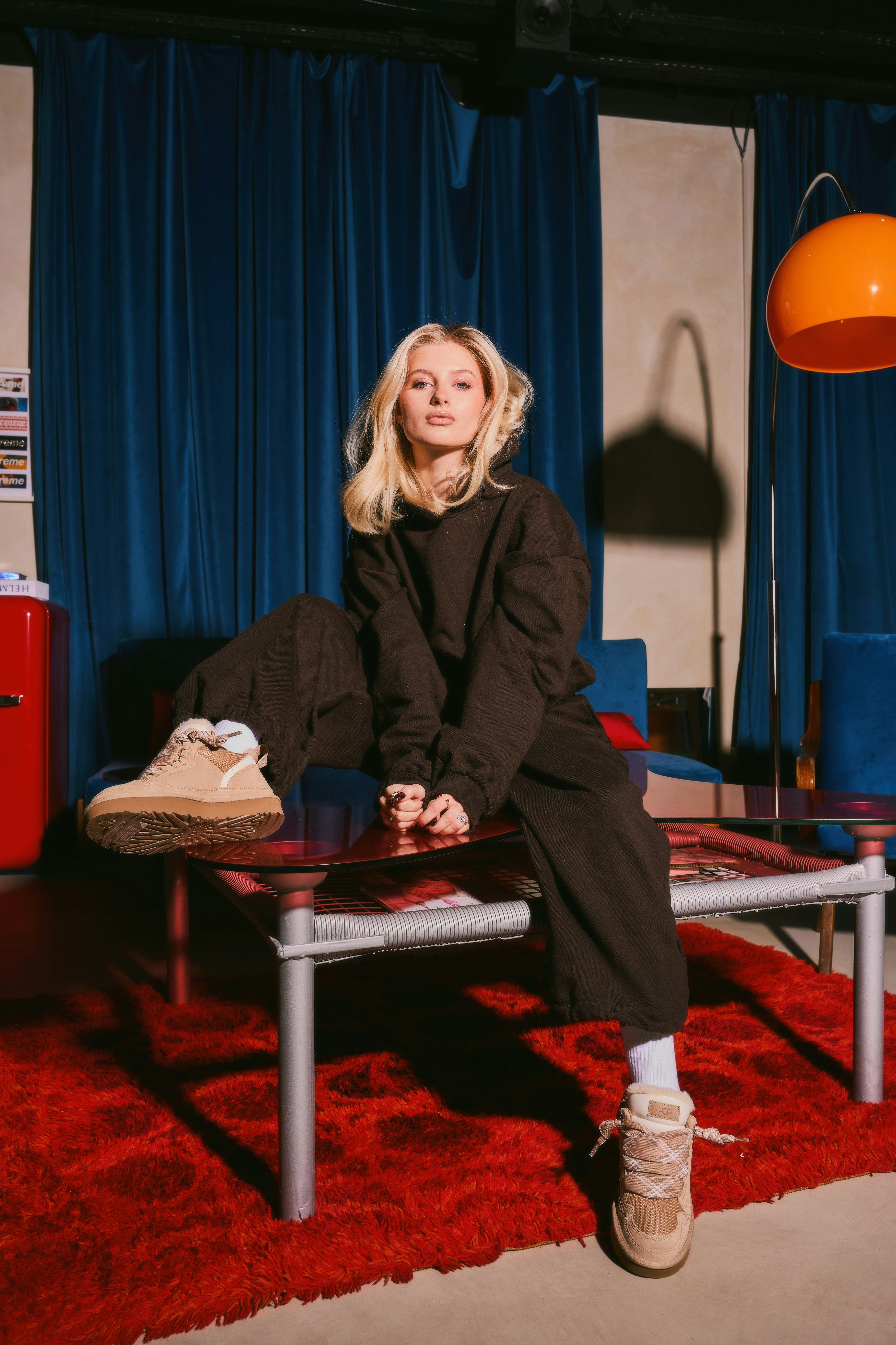 Locker Room Quiet: A Nomad in a Neon-Blue Backstage