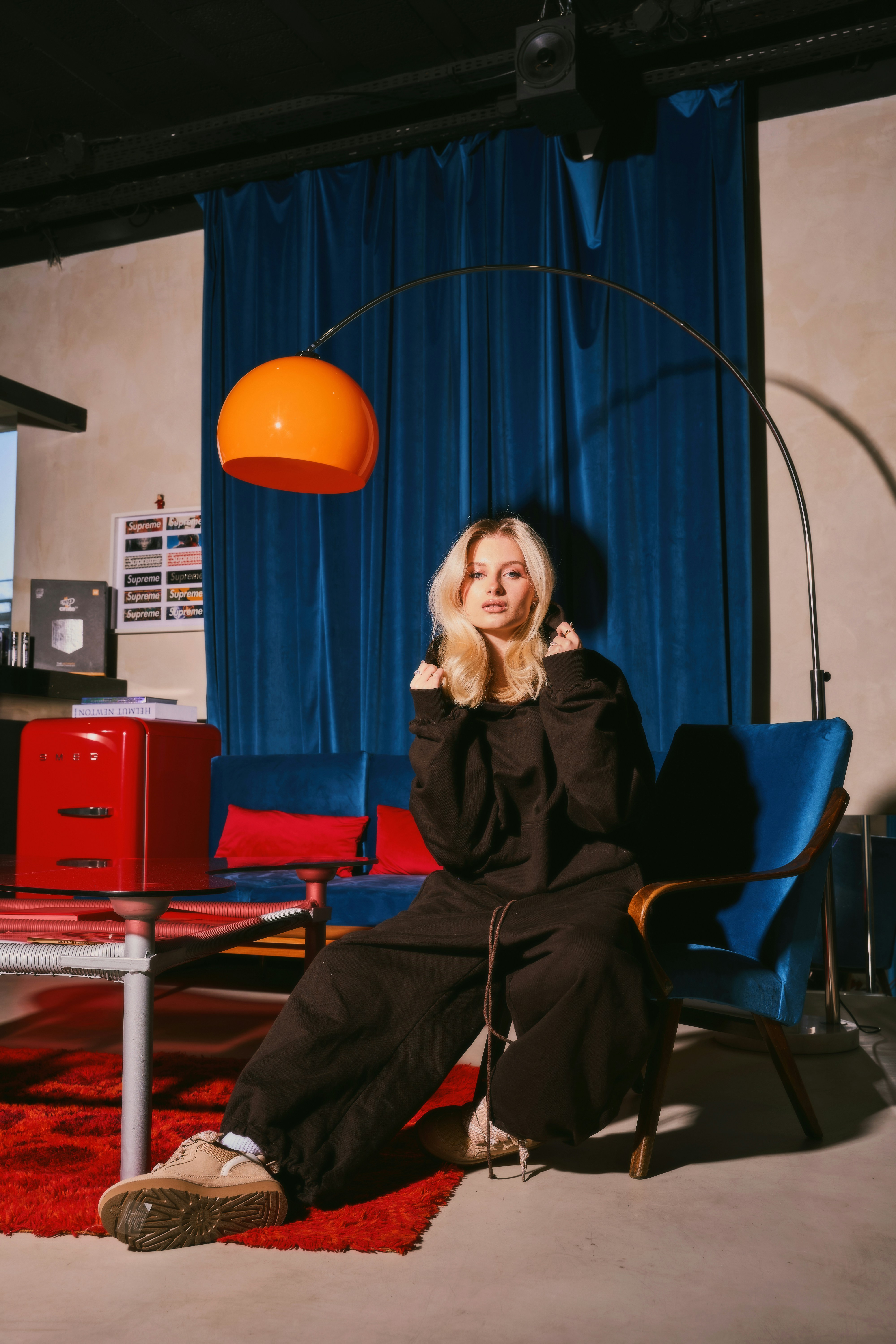 Blonde Muse in a Neon Living Room