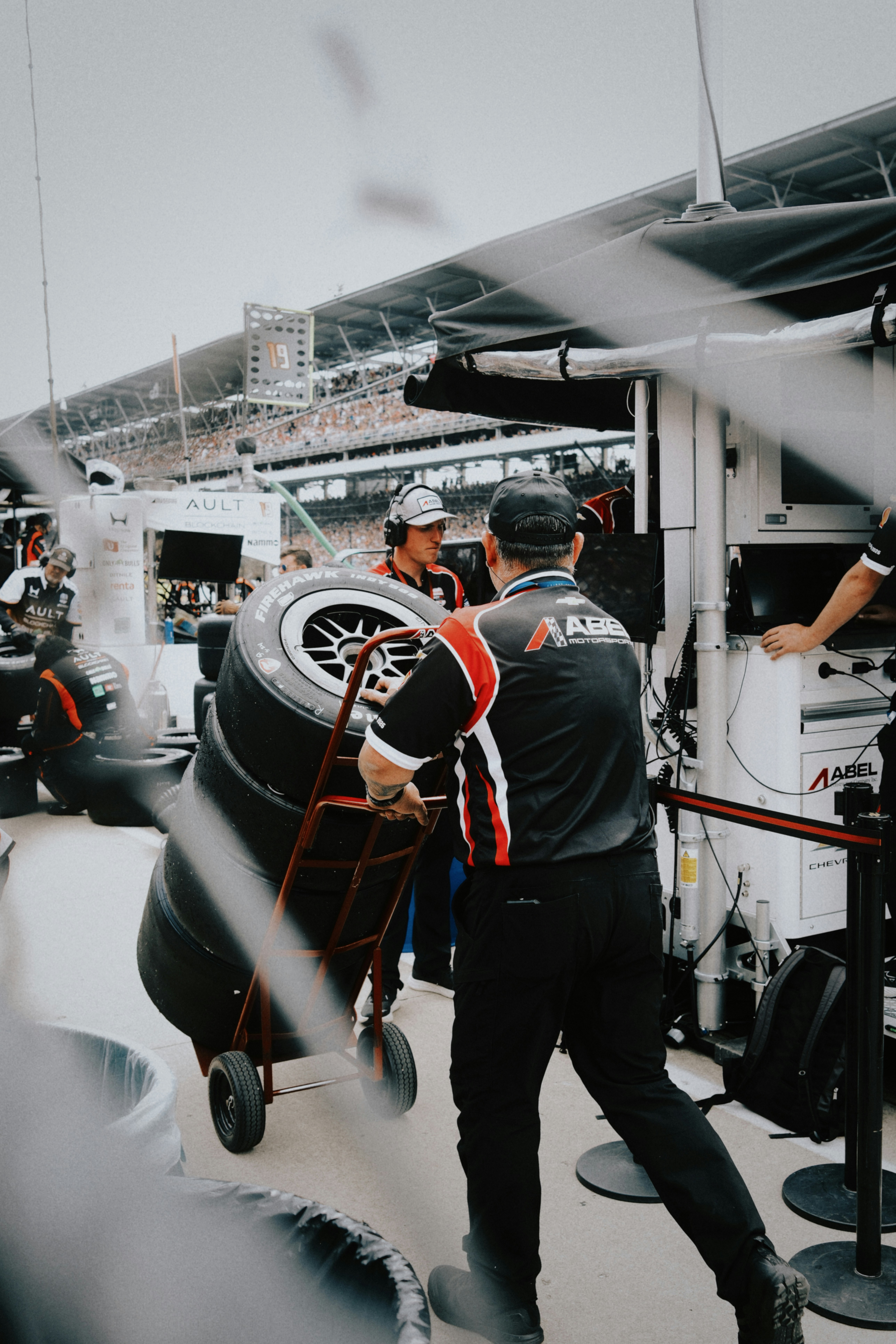 Tire Swap in the Pit Lane: A Wheel Change in Motion