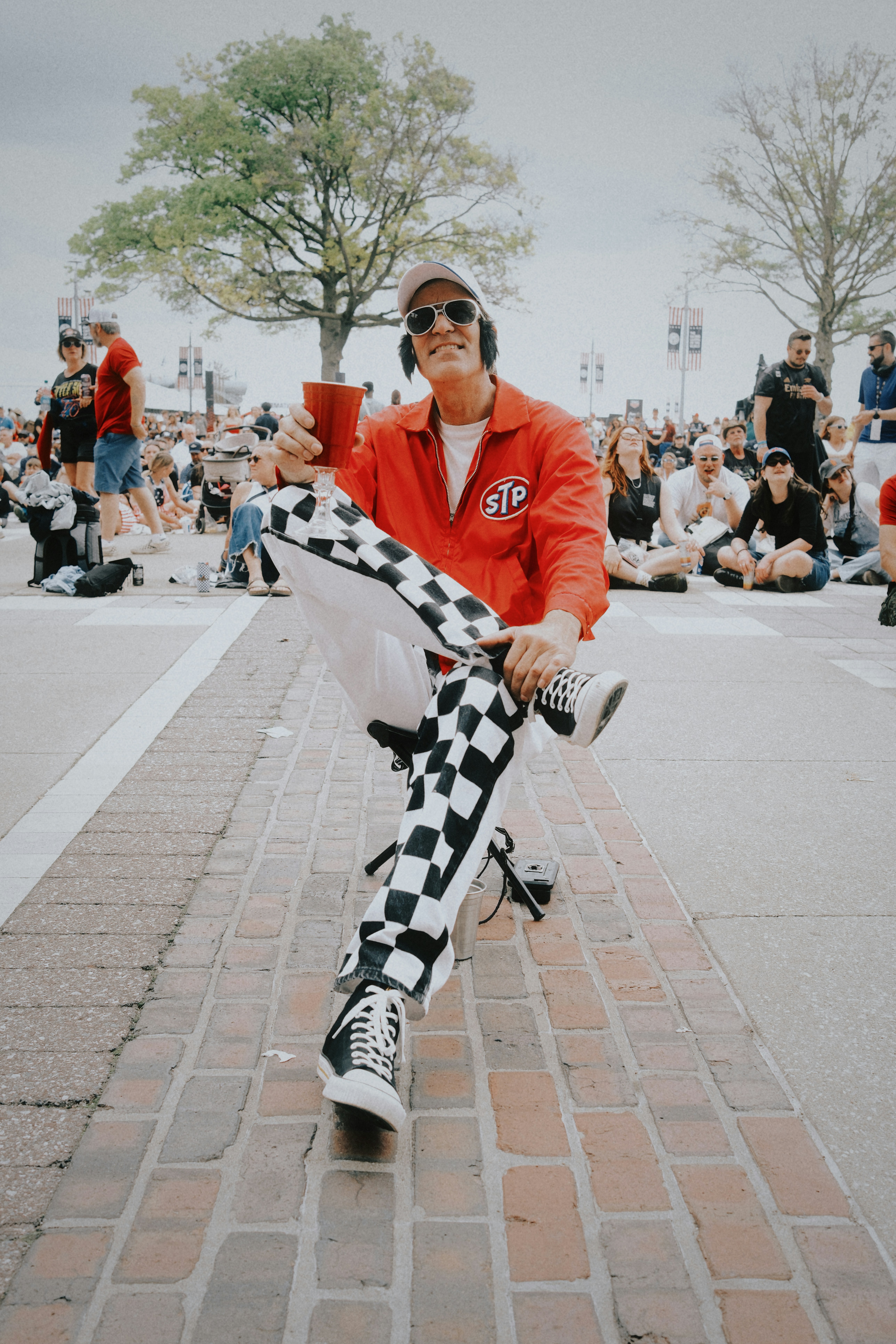 Red-Jacket Performer on a Brick Road Rally